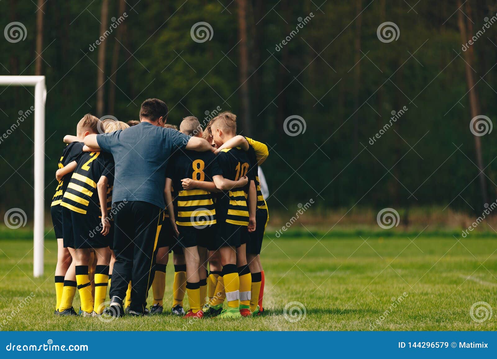 Coach Coaching Preschool Soccer Boy. Youth Coach Explaining Tactics ...