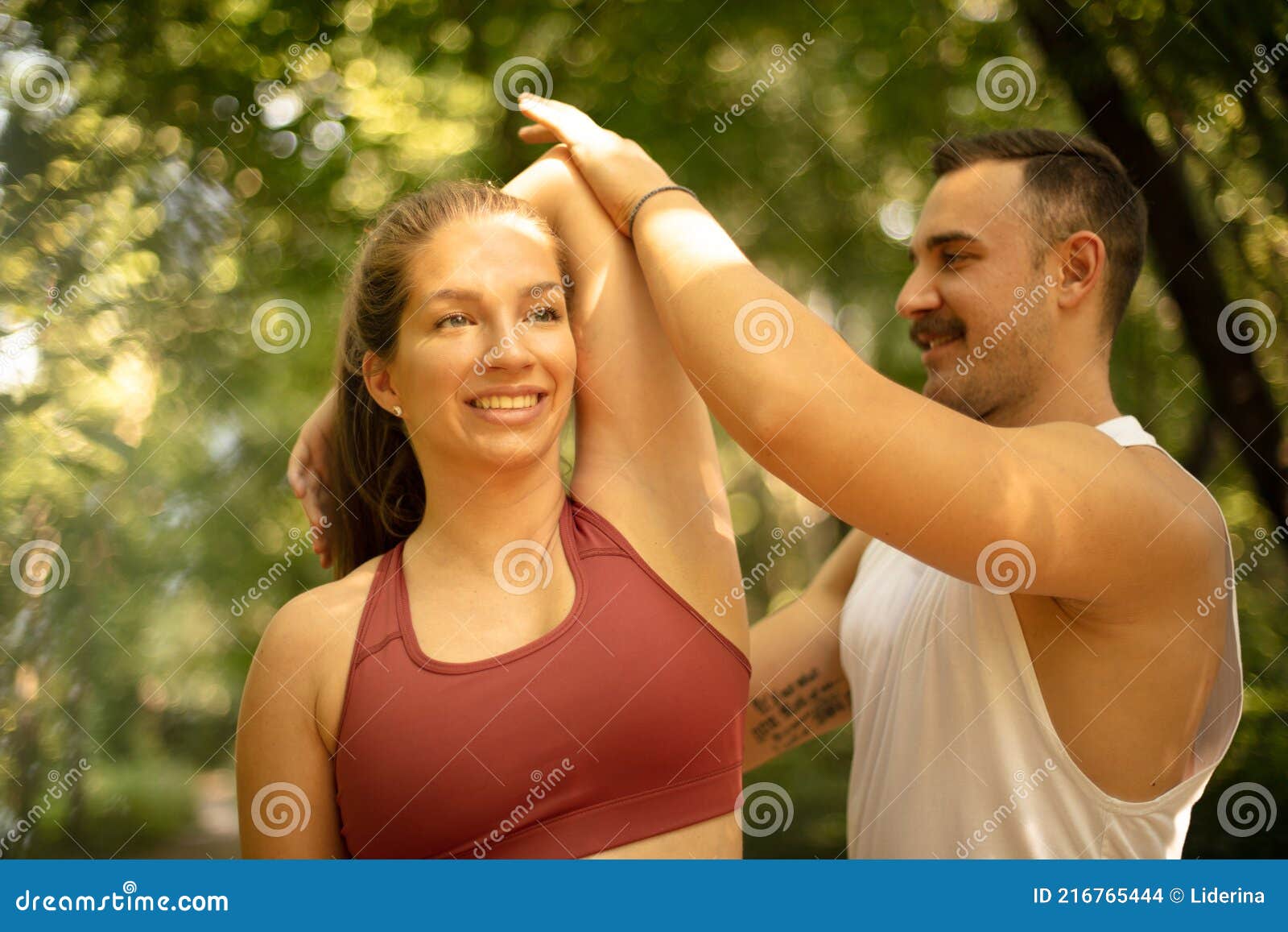 Coach Helping Woman in Exercise Stock Photo - Image of girlfriend, care ...