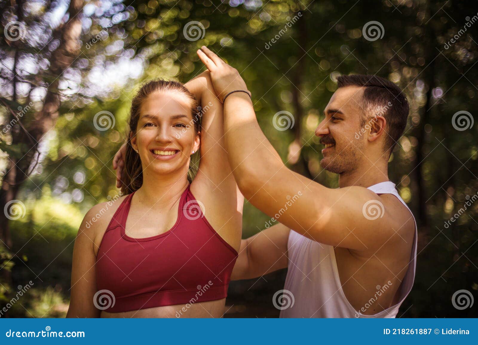 Coach Helping Woman in Exercise Stock Image - Image of activity, care ...
