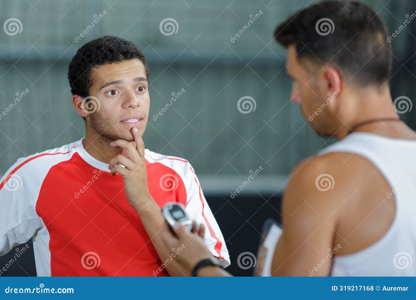 Coach and Play Football Talking Indoor Stock Photo - Image of indoors ...