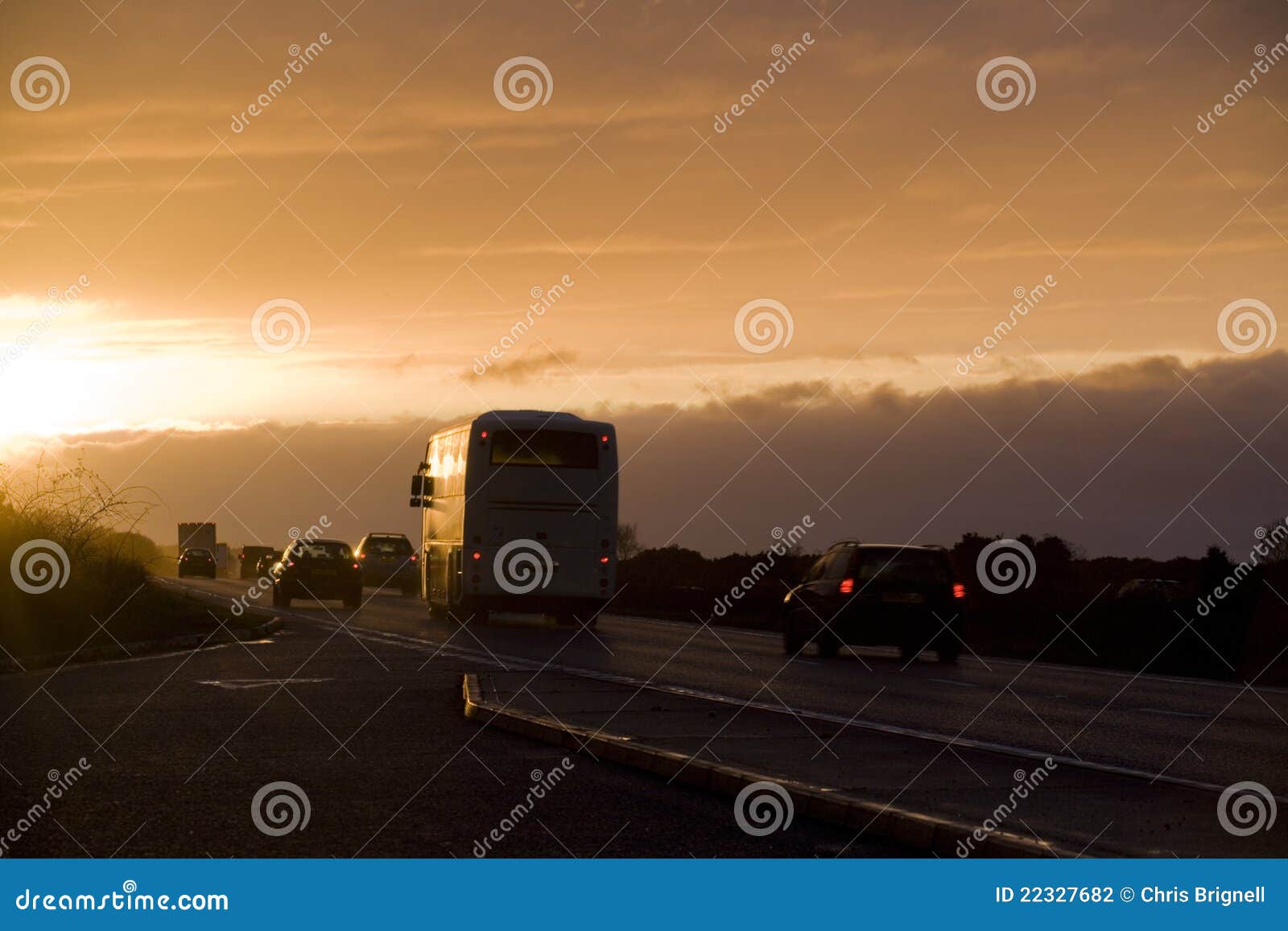Coach on a road at sunset stock photo. Image of sunrise - 22327682