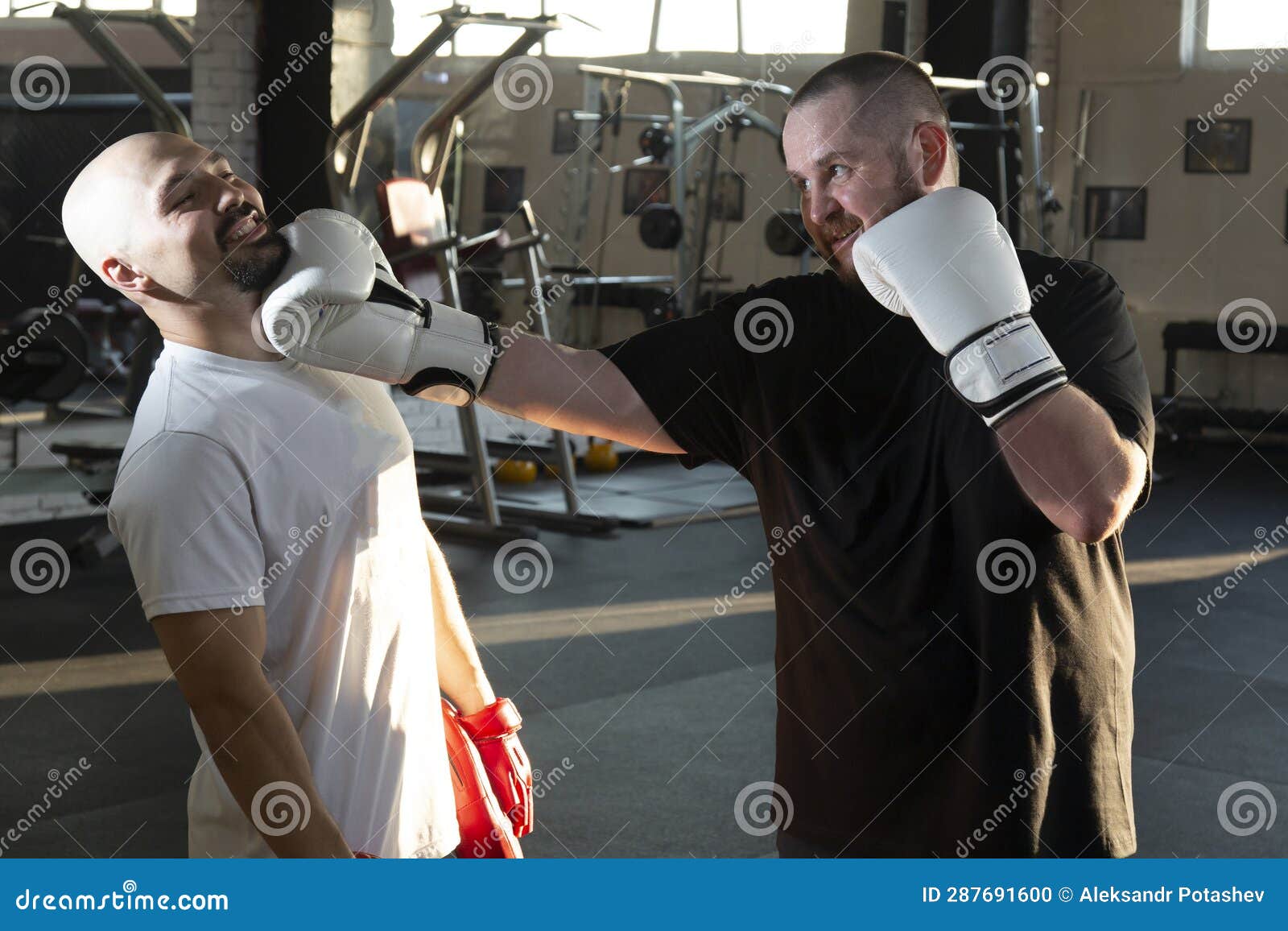 The Coach and the Student are Engaged in Boxing.Boxing Training in the ...