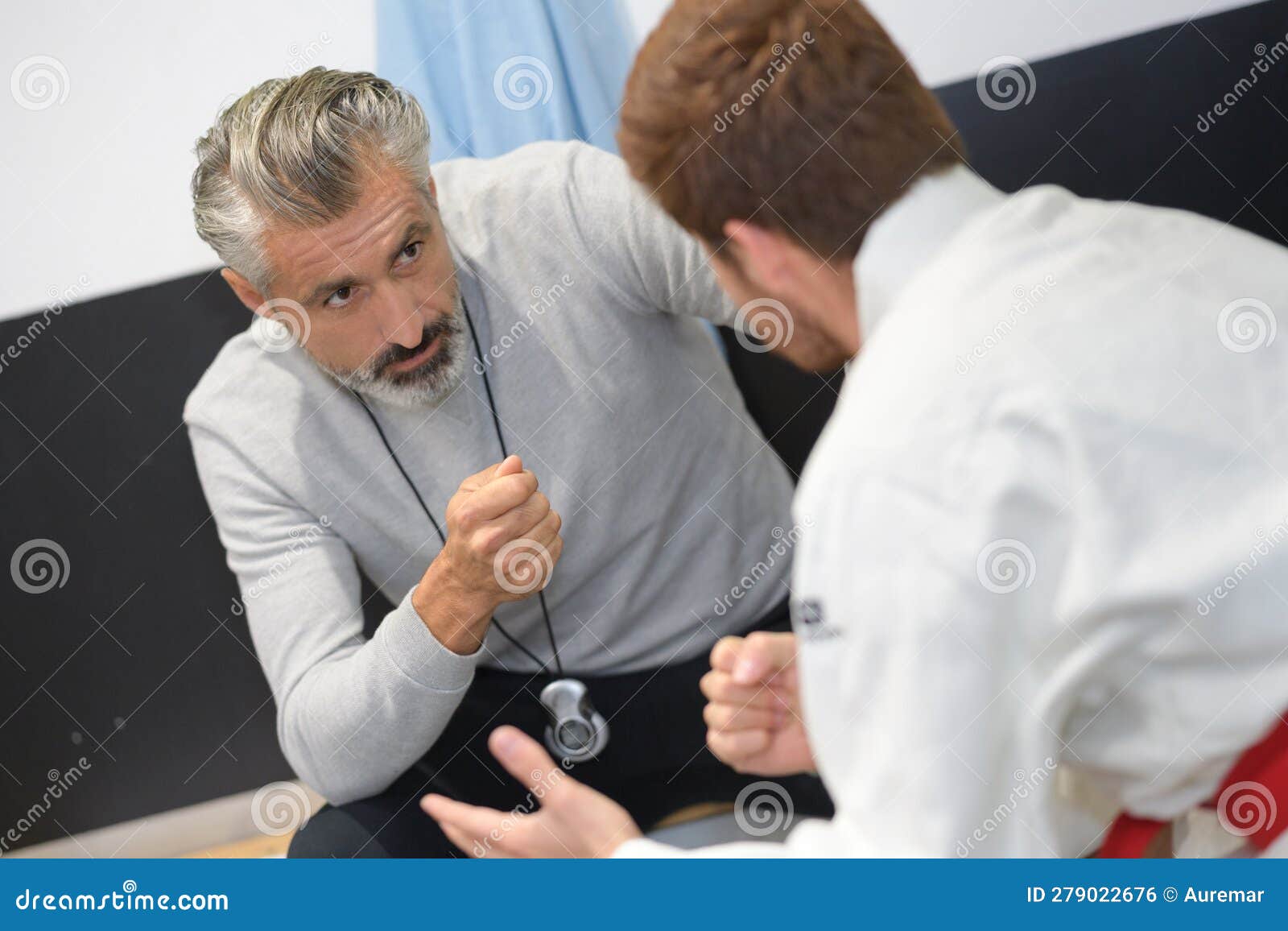 Coach Supporting Football Player Stock Photo - Image of north ...