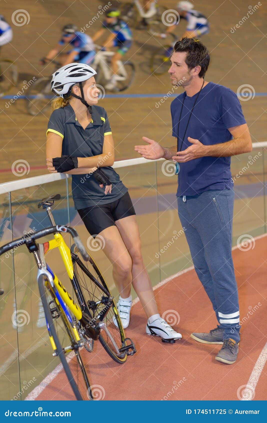 Coach Taking To Female Cyclist about Race Stock Image - Image of oval ...