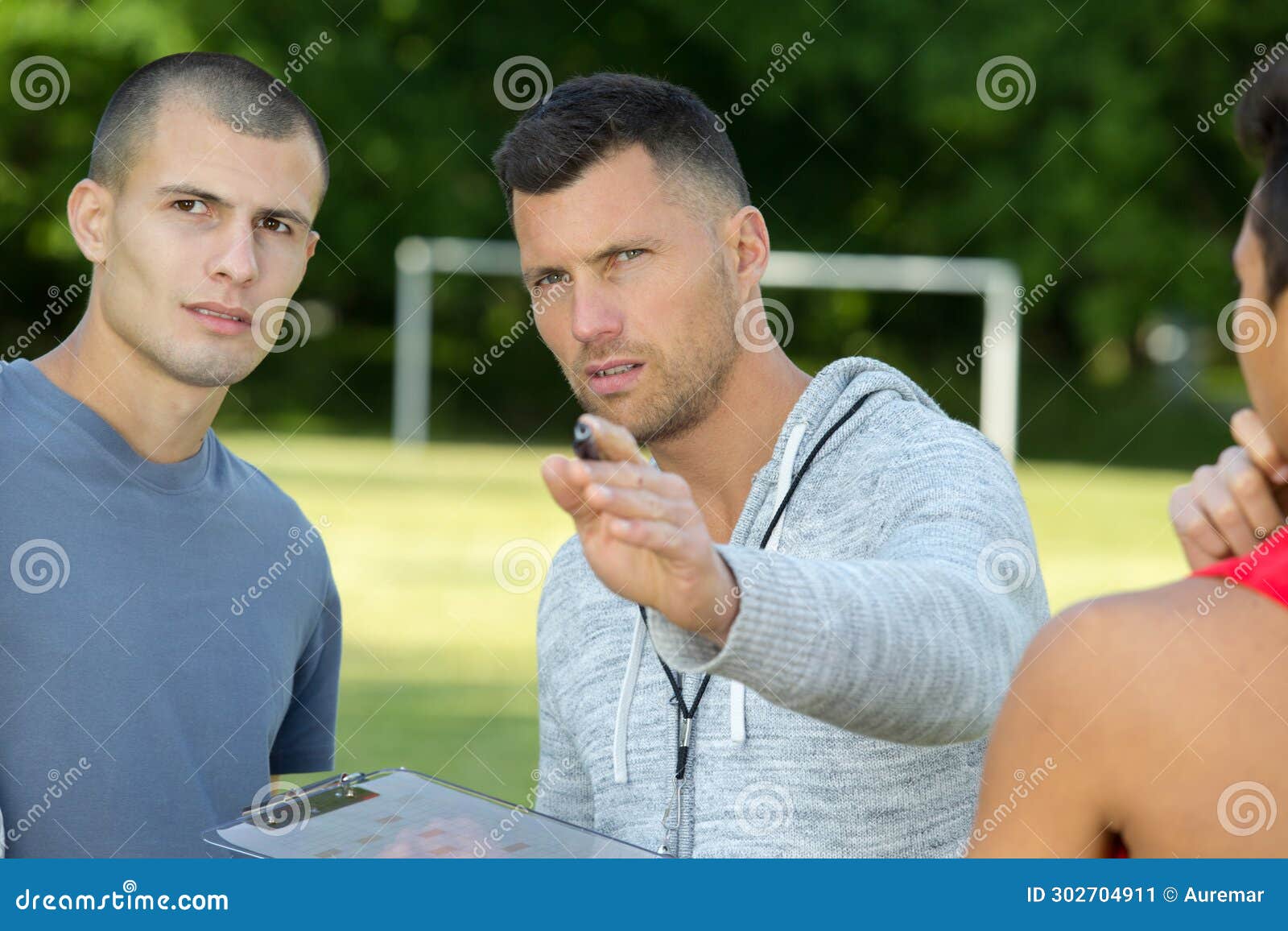 Coach talking to sportsman stock image. Image of trainer - 302704911