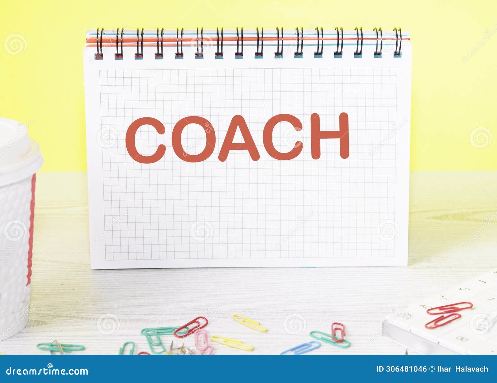 COACH the Word is Written on a Blank Sheet in a Notebook Standing on a ...