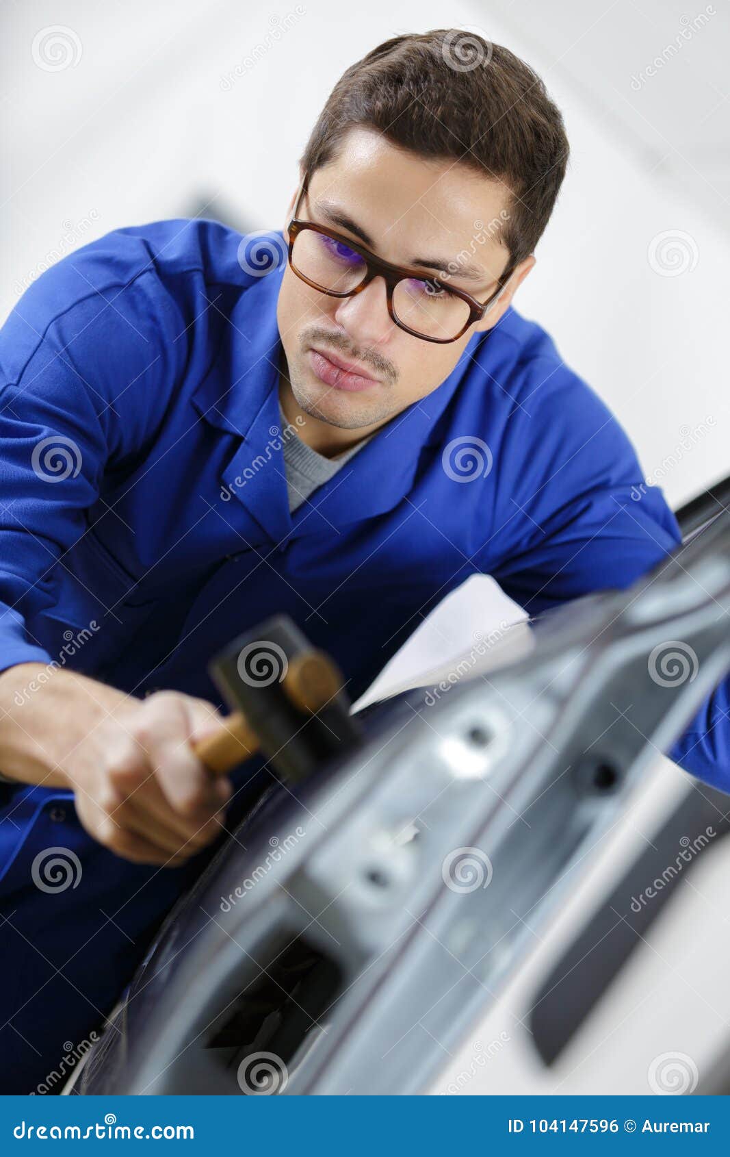 Coachbuilder Using Hammer To Bend Car Door Stock Photo - Image of ...
