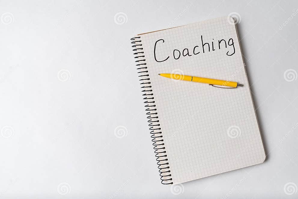 COACHING Words Written on Notebook Over White Background. Top View of ...