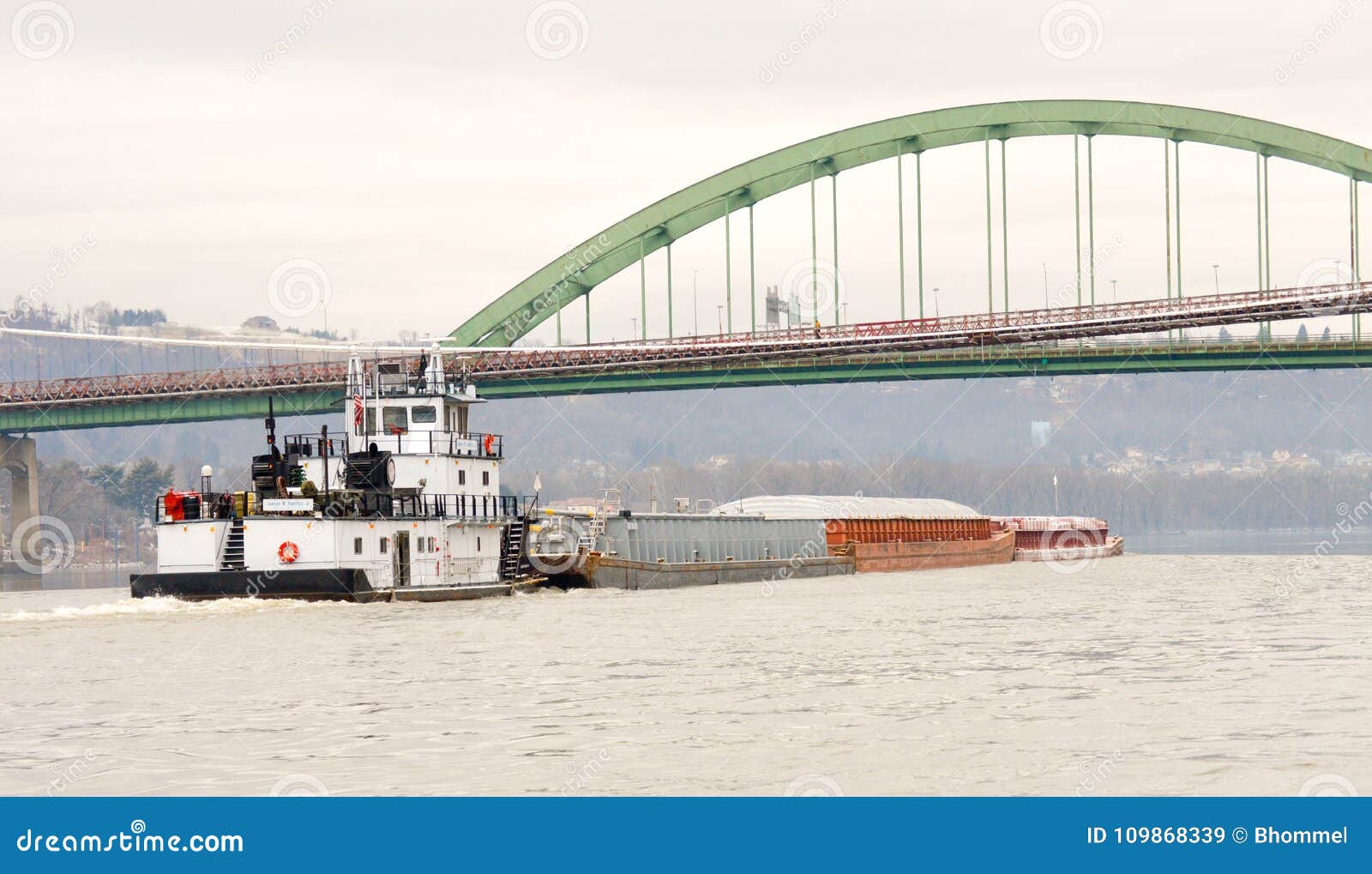 Coal Barge Going Down the Ohio River Under a Bridge Editorial Stock ...