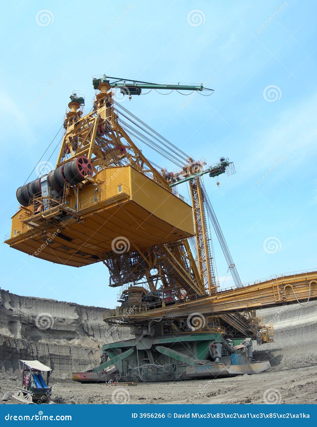 Coal digger in action stock photo. Image of hydraulic - 3956266