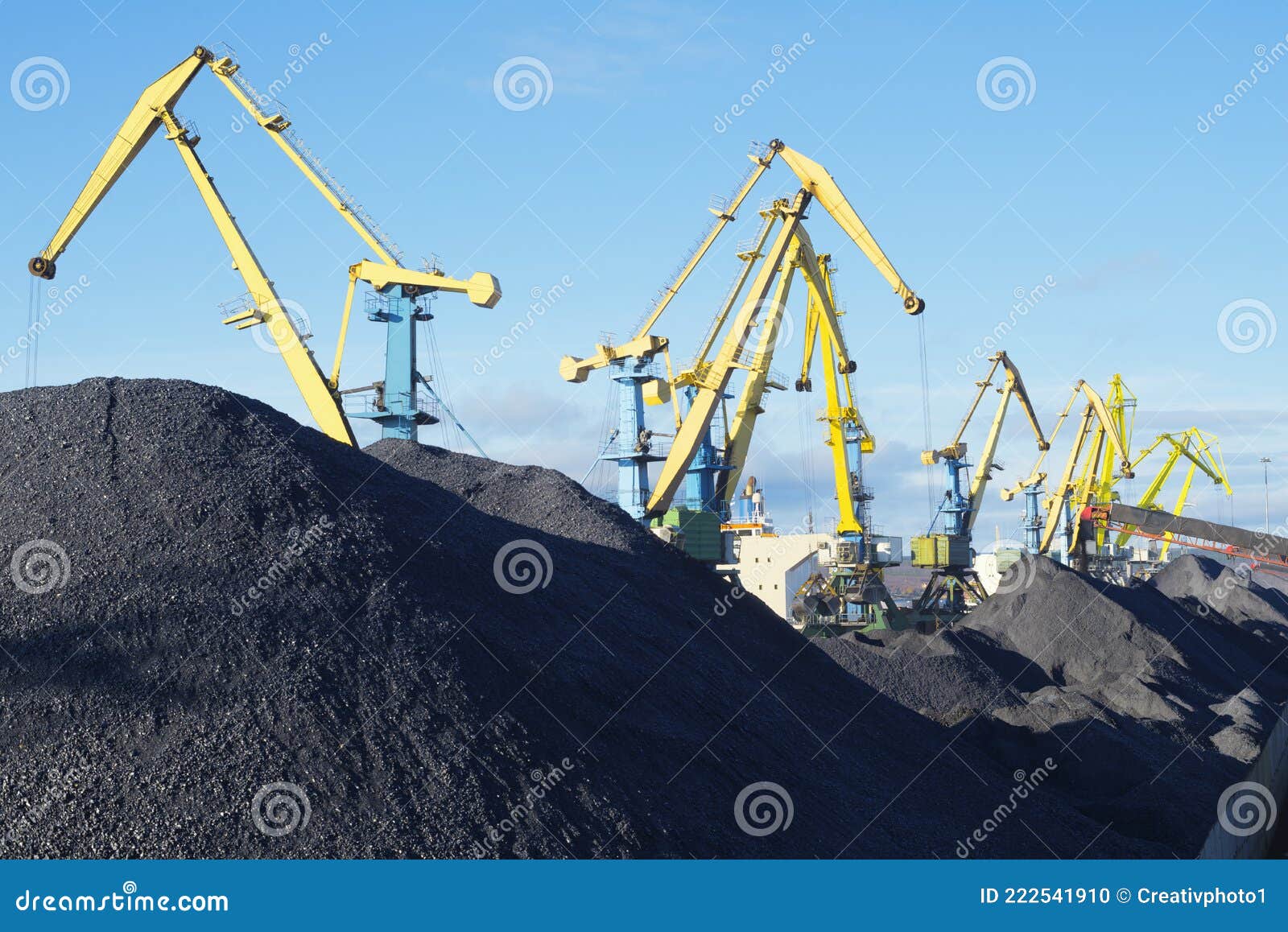 Coal is Loaded into the Holds of a Dry Cargo Ship in the Seaport 24 ...