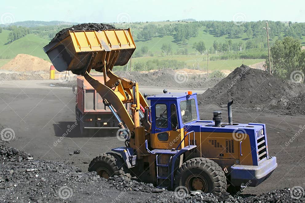 Coal mining. Coal loader. stock photo. Image of power - 66443514
