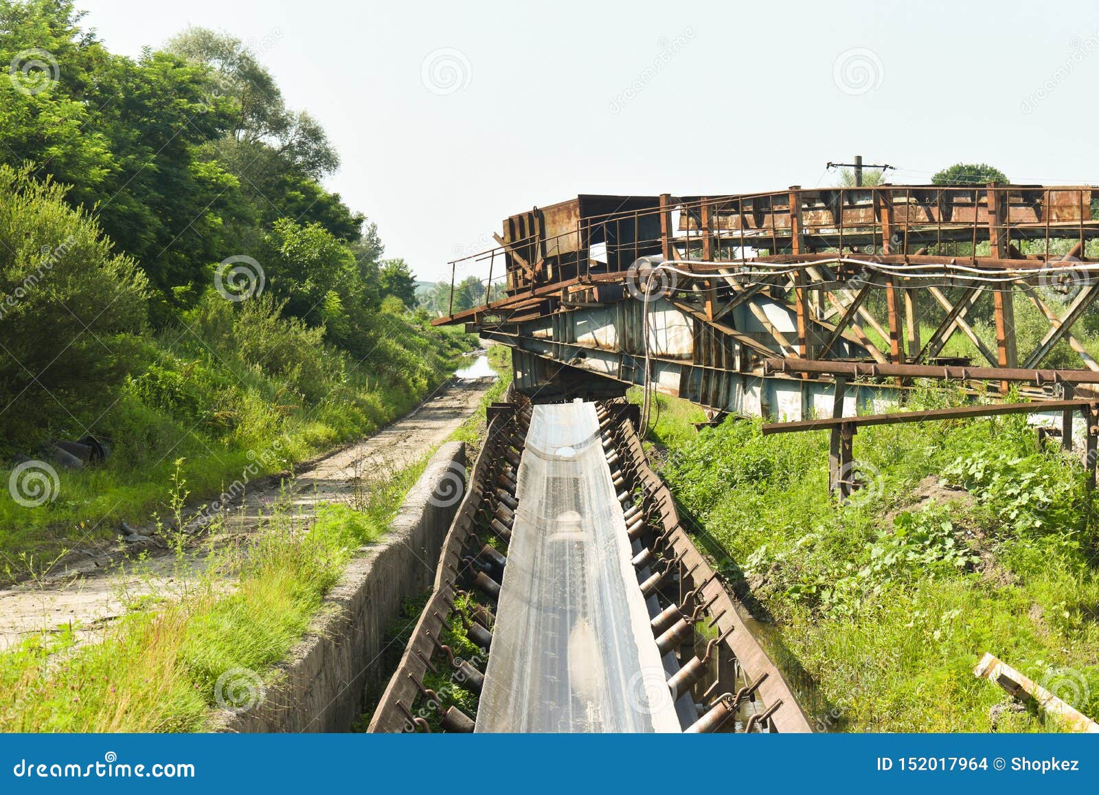 Coal Transportation Line for Processing. Belt Conveyor Inside the Open ...