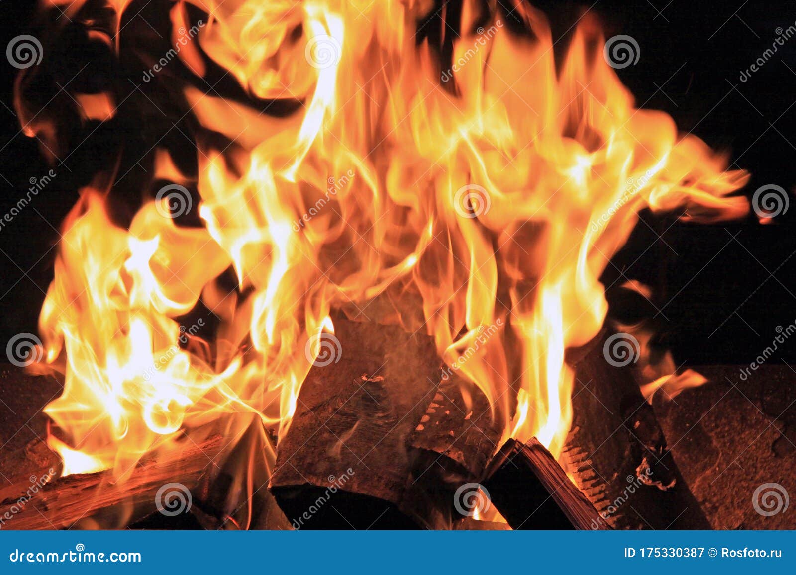 Coals smolder in a fire stock image. Image of fireplace - 175330387