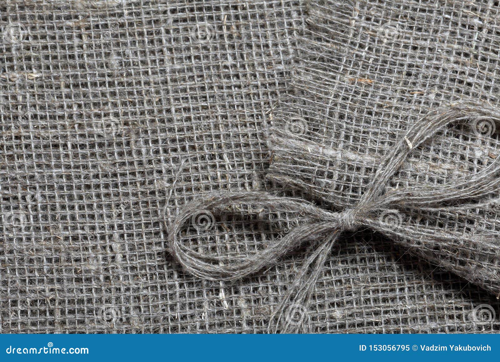 Coarse Linen Fabric. on it Lies a Bow of Linen Thread Stock Image ...
