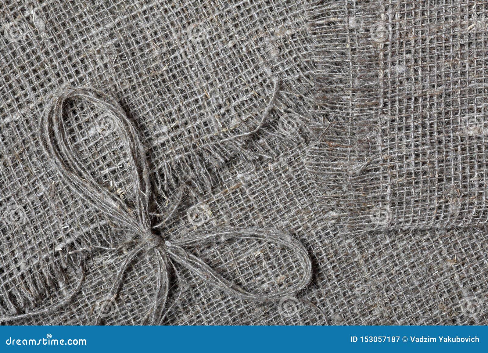 Coarse Linen Fabric. on it Lies a Bow of Linen Thread Stock Image ...