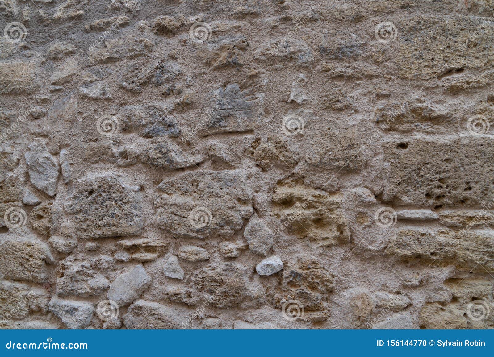 Coarse Old Natural Stone Wall Made of Different Sized Stones Stock ...