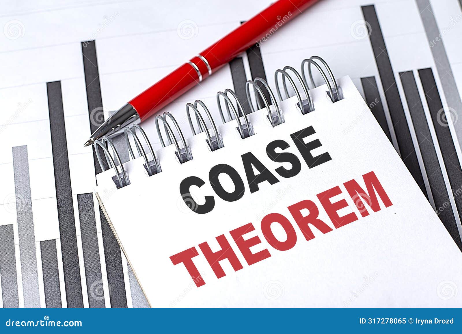 COASE THEOREM Text on Notebook on Chart with Pen Stock Image - Image of ...
