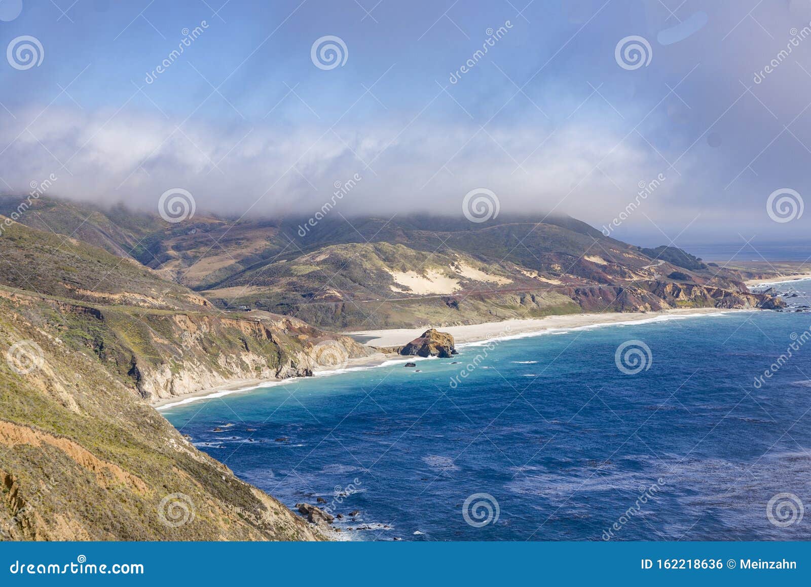 Coast in Big Sur with Point Sur Light at Horizon Stock Photo - Image of ...