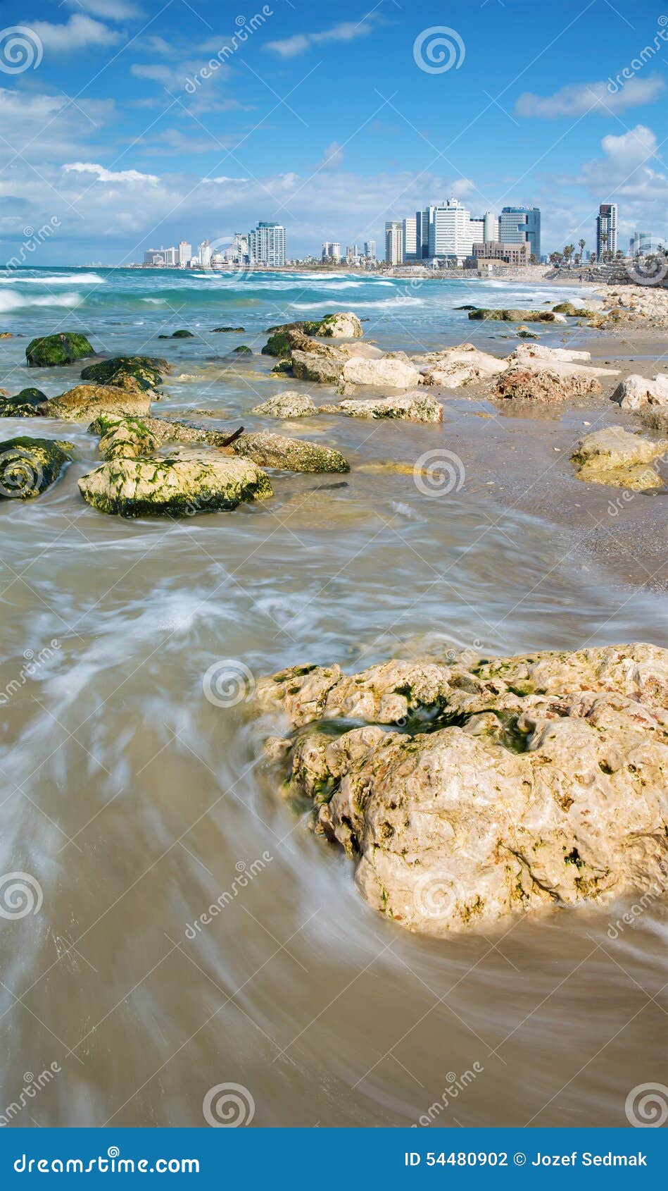 The coast of Tel Aviv stock photo. Image of boulders - 54480902