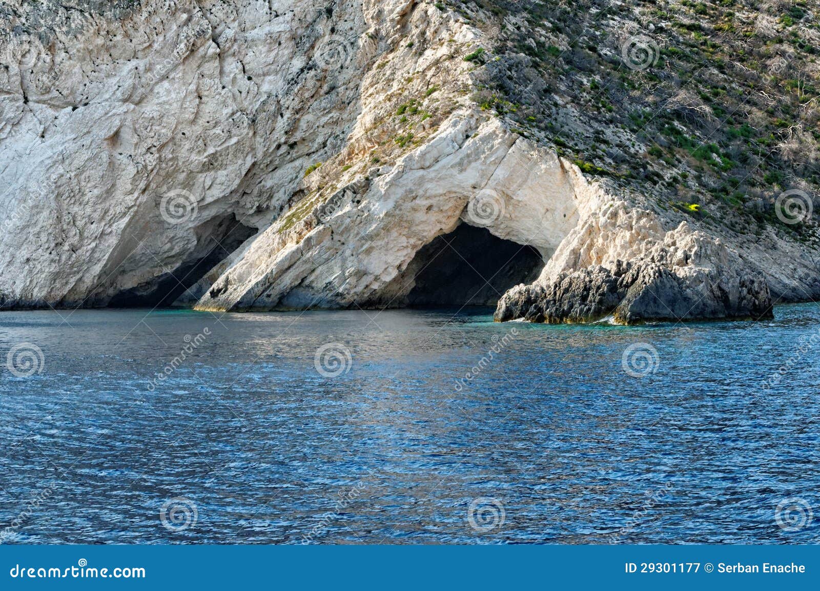 Coastal caves in Zakynthos stock image. Image of rock - 29301177