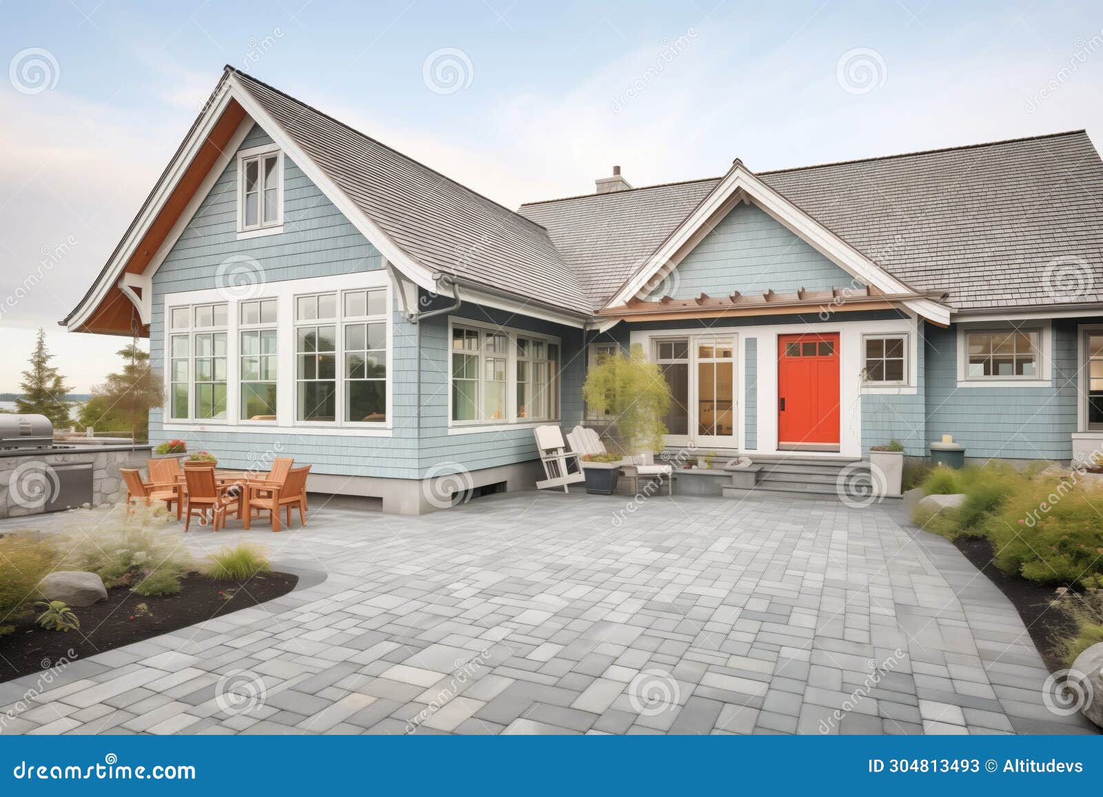 Coastal Home with Cedar Shingles and Gray Stone Base Stock Image ...