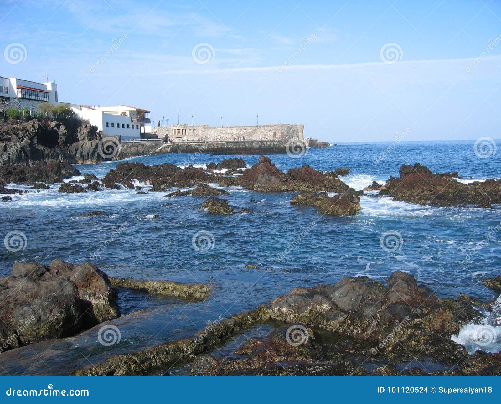 Coastal rock reef in Spain stock photo. Image of peaceful - 101120524