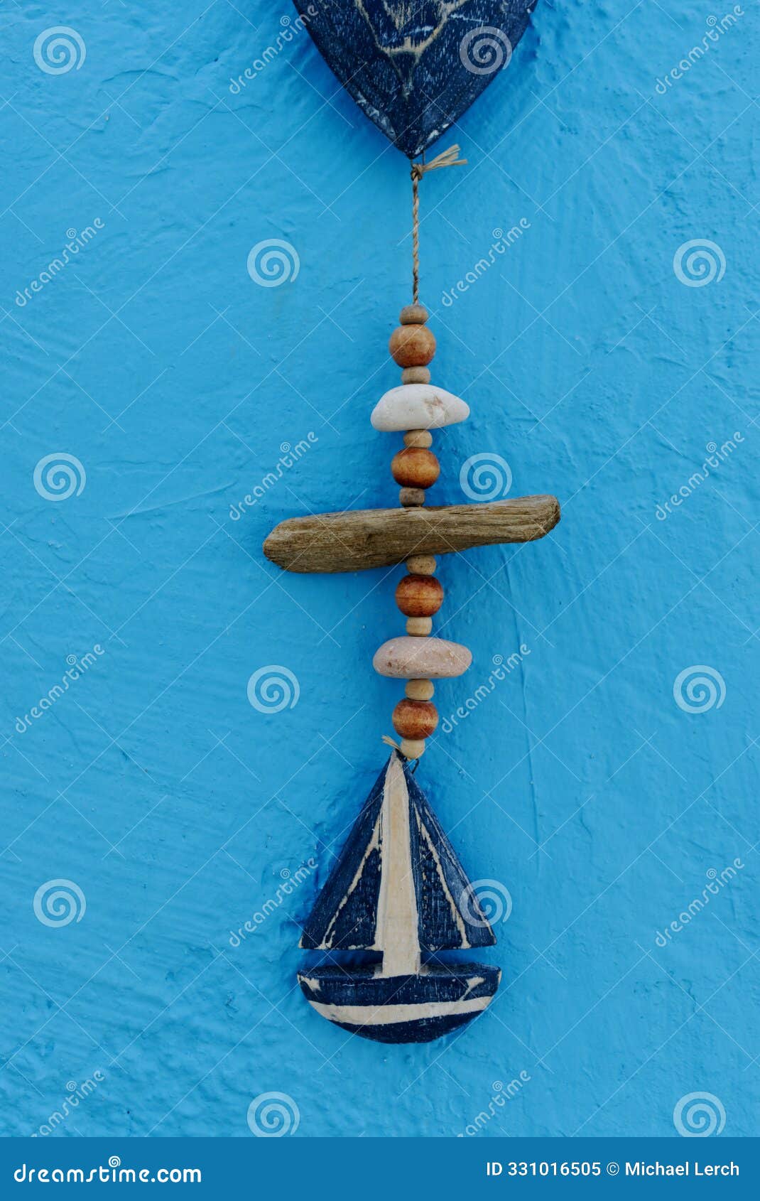 Coastal Themed Decoration Hanging on a Blue Wall Stock Image - Image of ...
