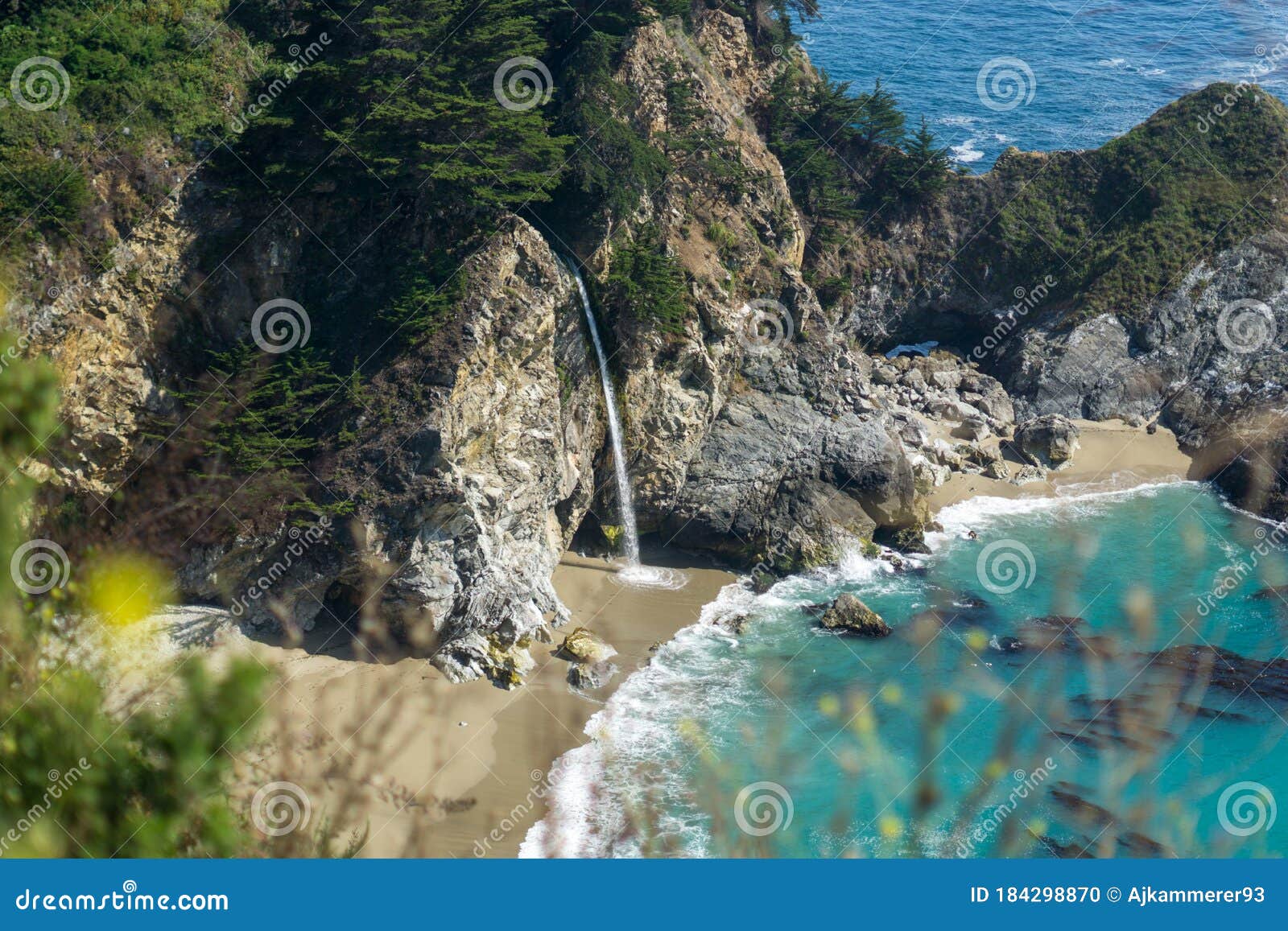 Coastal Waterfall Cascading Onto Pacific White Sand Beach Surrounded by ...