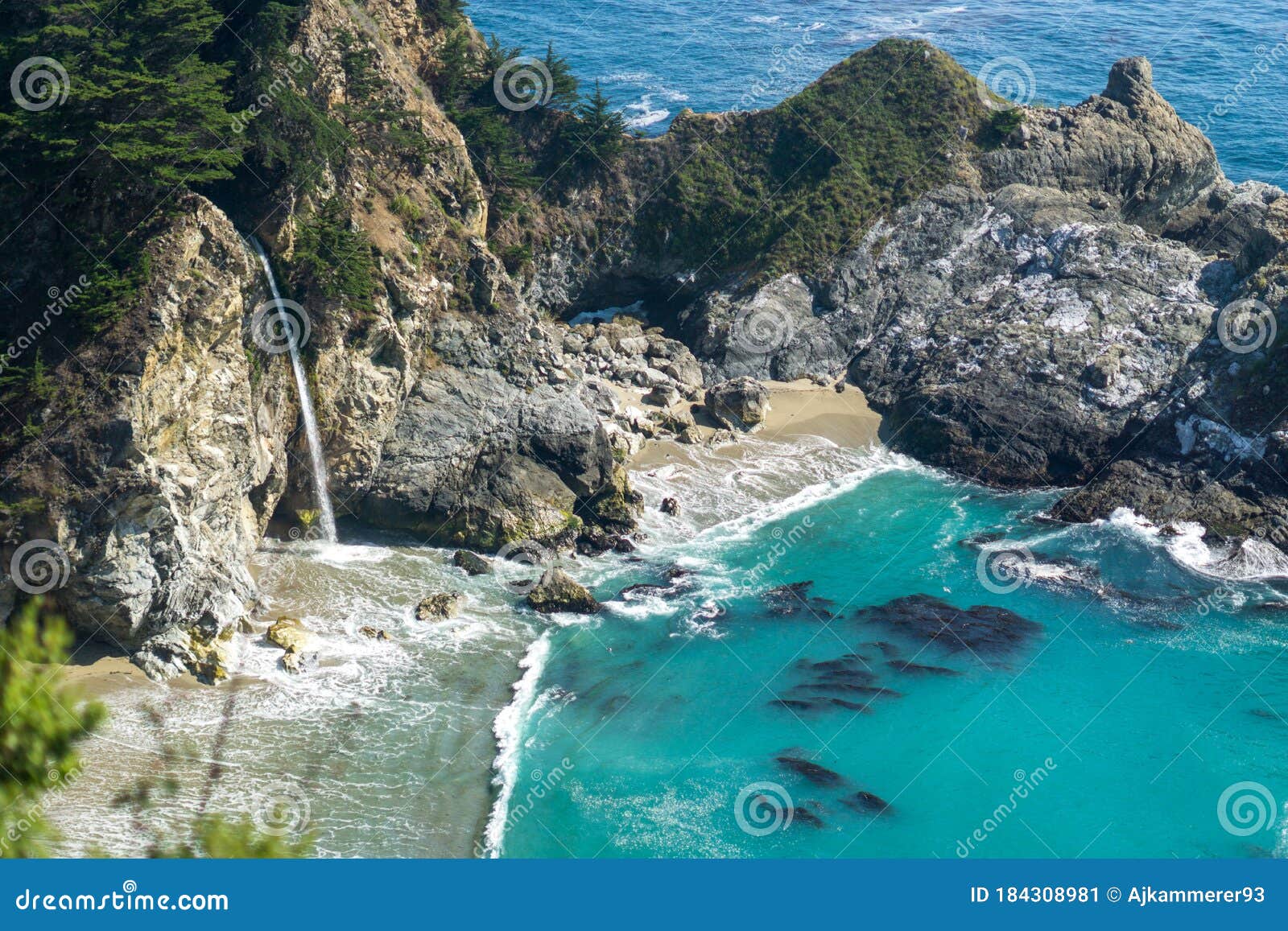 Coastal Waterfall Cascading Onto Pacific White Sand Beach Surrounded by ...