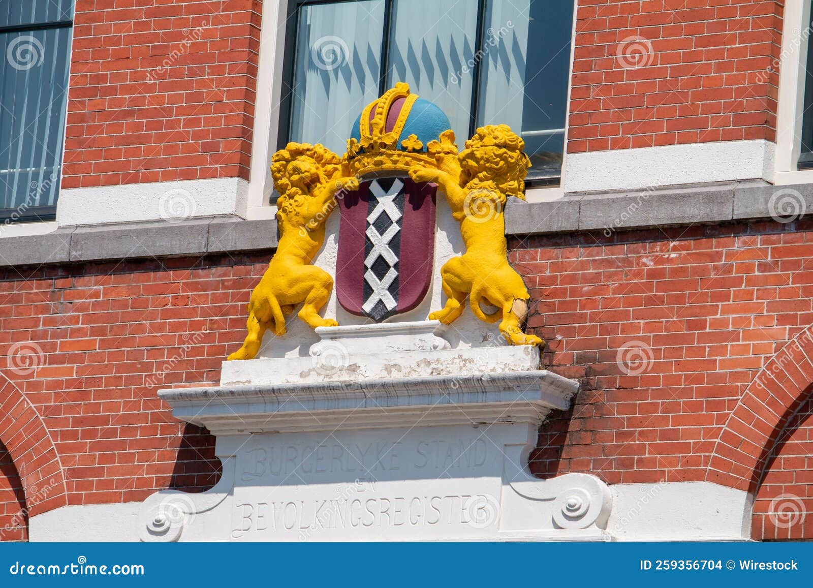 Coat of Arms of Amsterdam on the Facade of a Brick Building Stock Photo ...