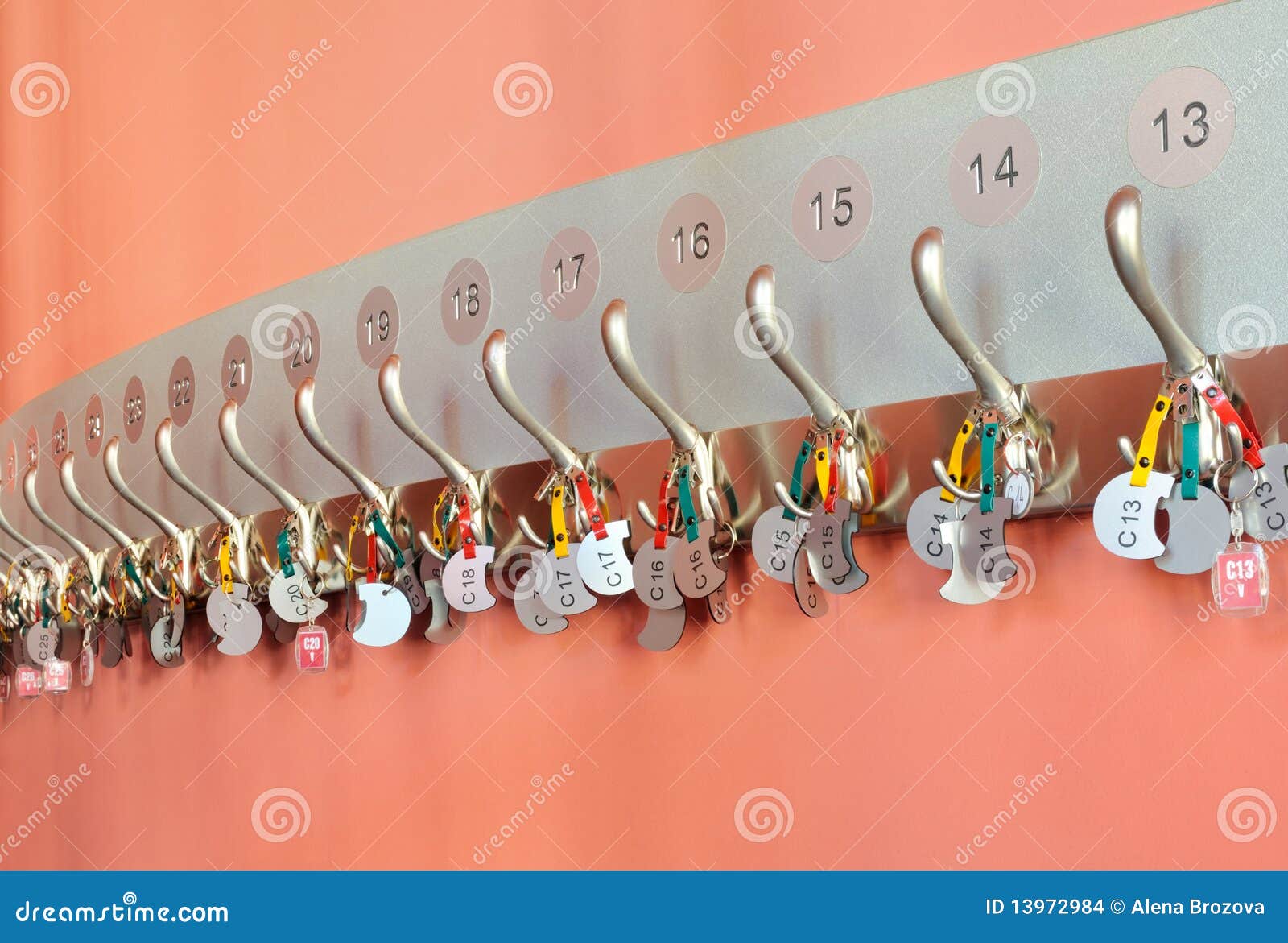 Coat Hooks with Labels Organized in a Row Stock Photo - Image of hanged ...