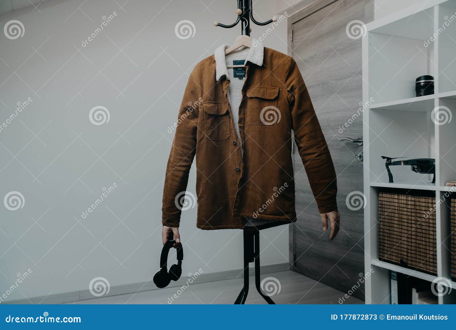 Coat with humans hands stock image. Image of coat, creative - 177872873
