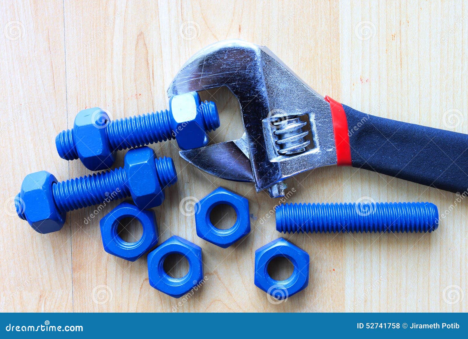 Coated Stud Bolt and Nut on Wood Texture Stock Photo - Image of ...