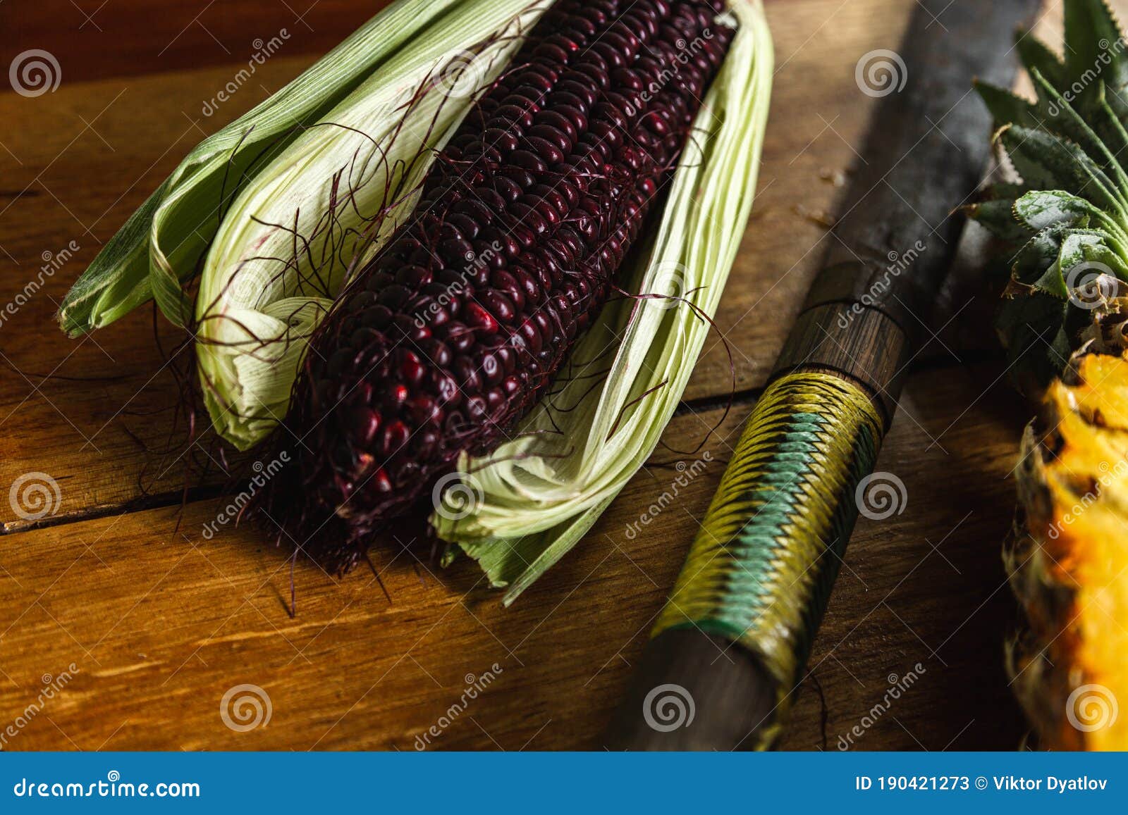 The Cob of Purple Corn with a Knife is on the Table Stock Image - Image ...