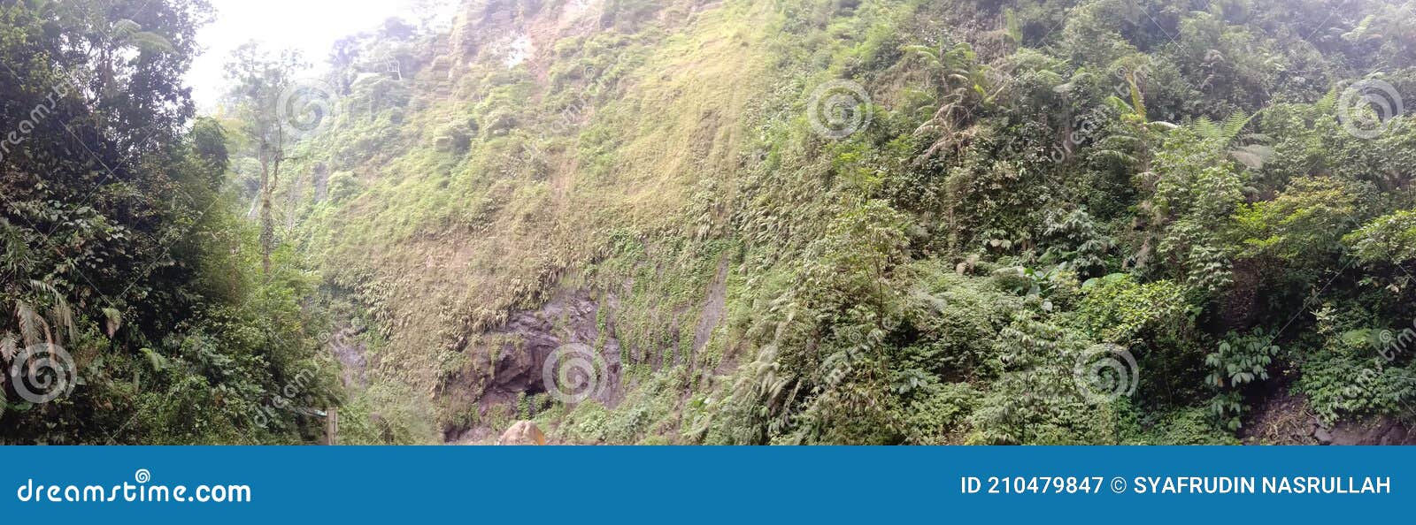 Coban Pelangi Waterfall stock image. Image of mountain - 210479847