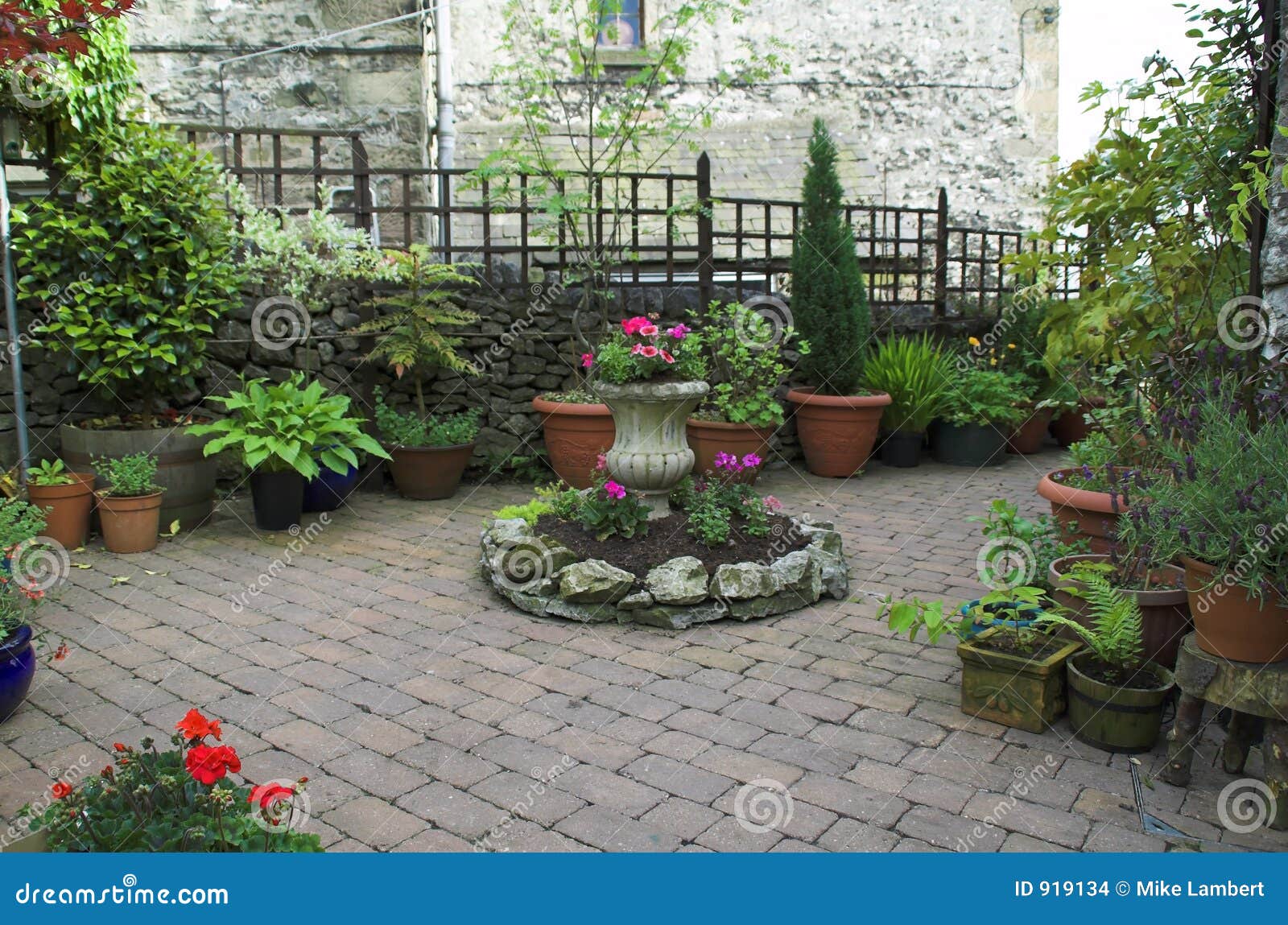 Cobbled garden stock photo. Image of flowers, yard, trees - 919134