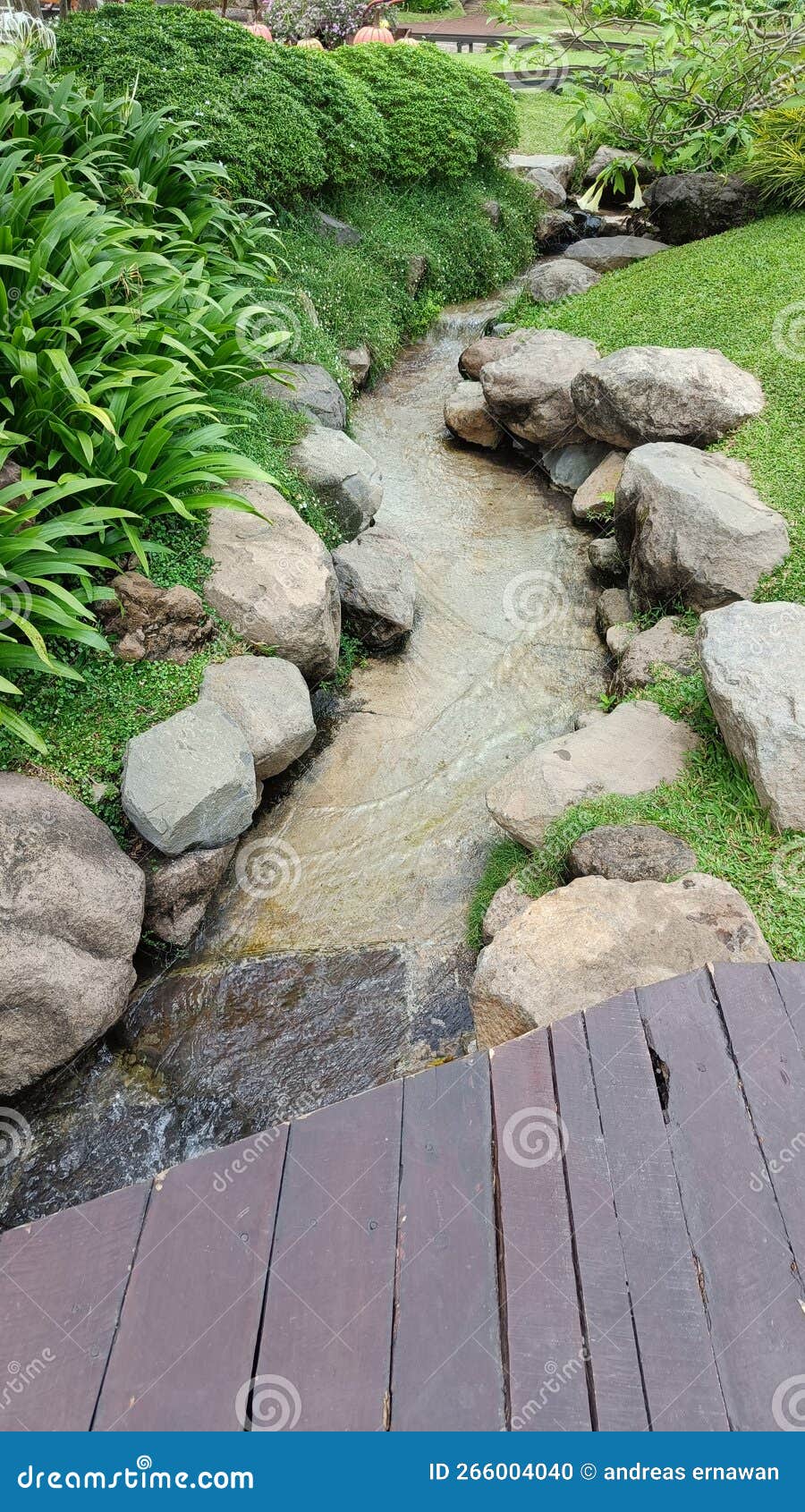 Cobbled Path in a Beautiful Green Garden Stock Photo - Image of stream ...