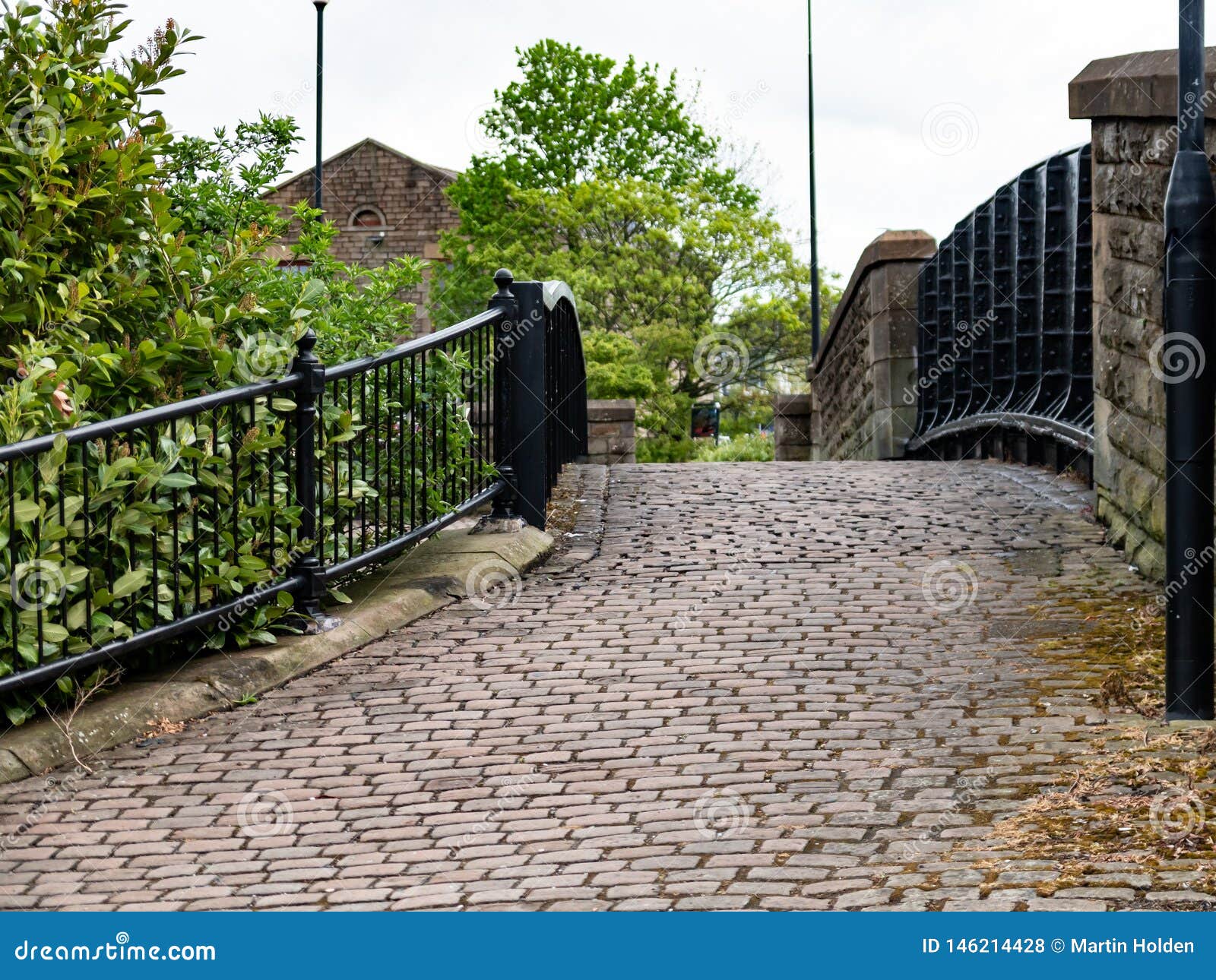 Cobbled path on bridge stock photo. Image of urban, streets - 146214428