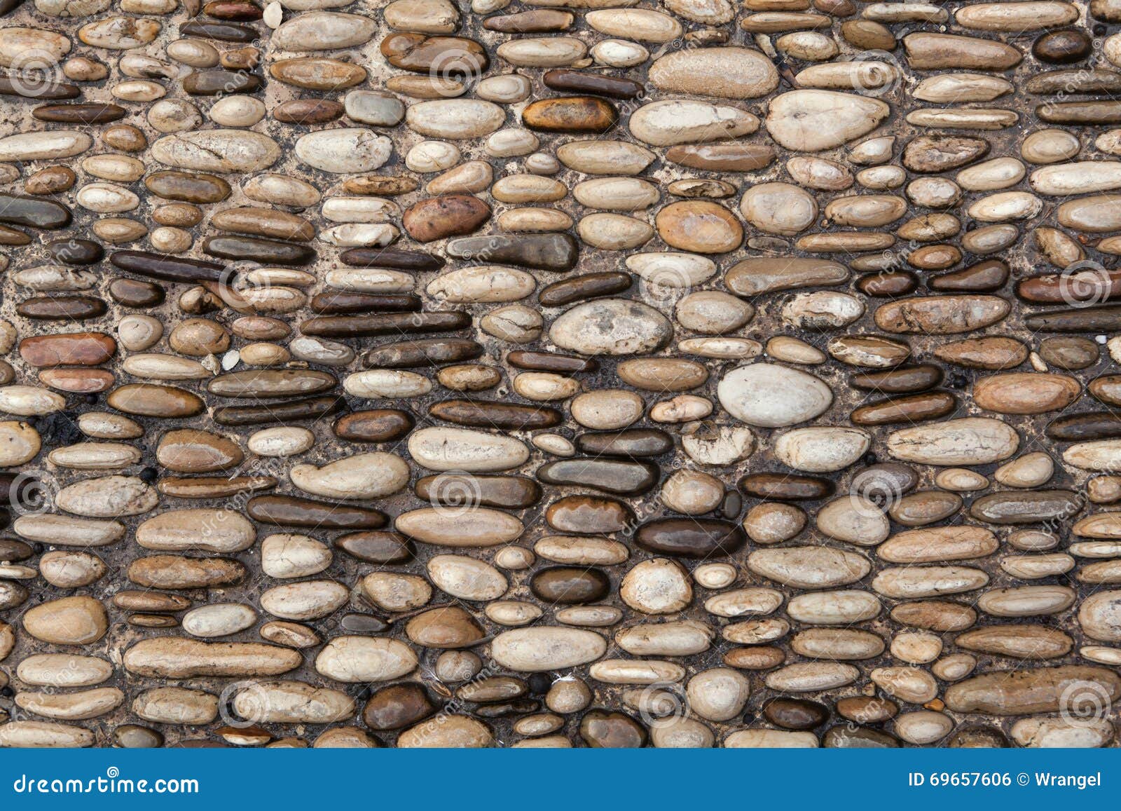 Cobbled Pavement Made of River Rounded Pebbles. Background Texture ...