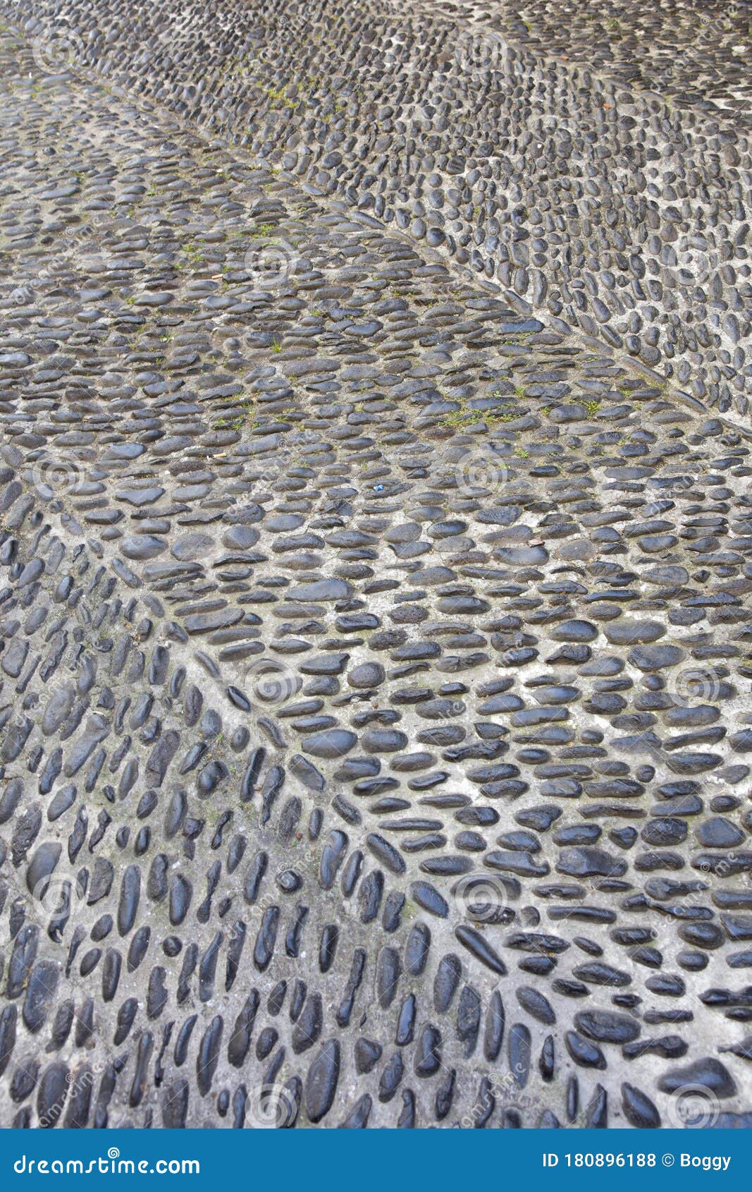 Cobbled Pavement Made of Rounded Pebbles Stock Photo - Image of ...