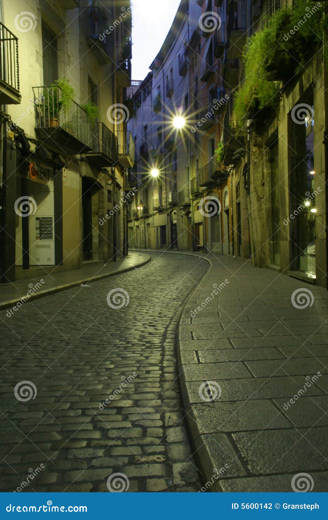 Cobbled street stock photo. Image of night, sidewalk, cobbled - 5600142