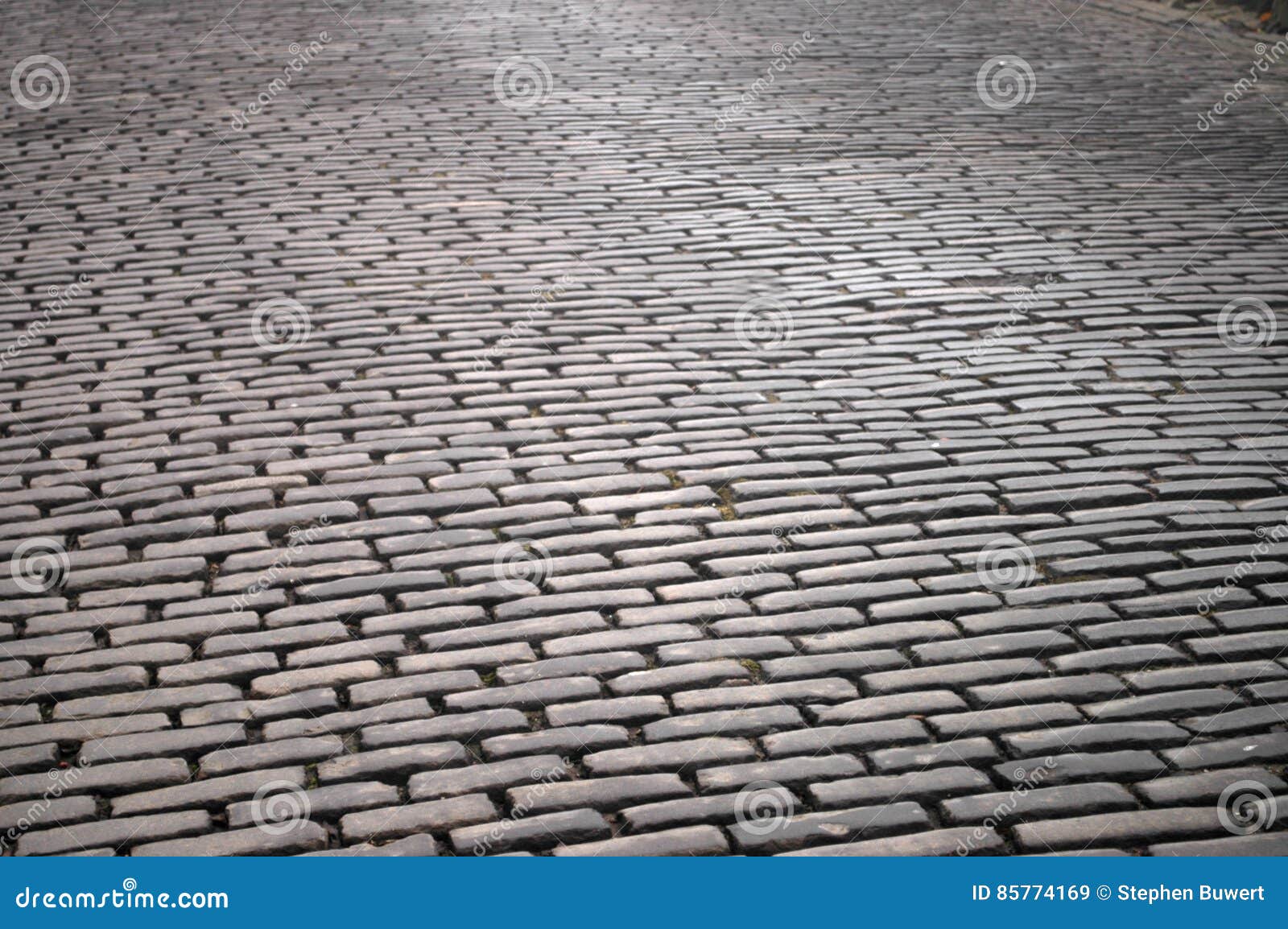 Cobbled street background. stock image. Image of road - 85774169