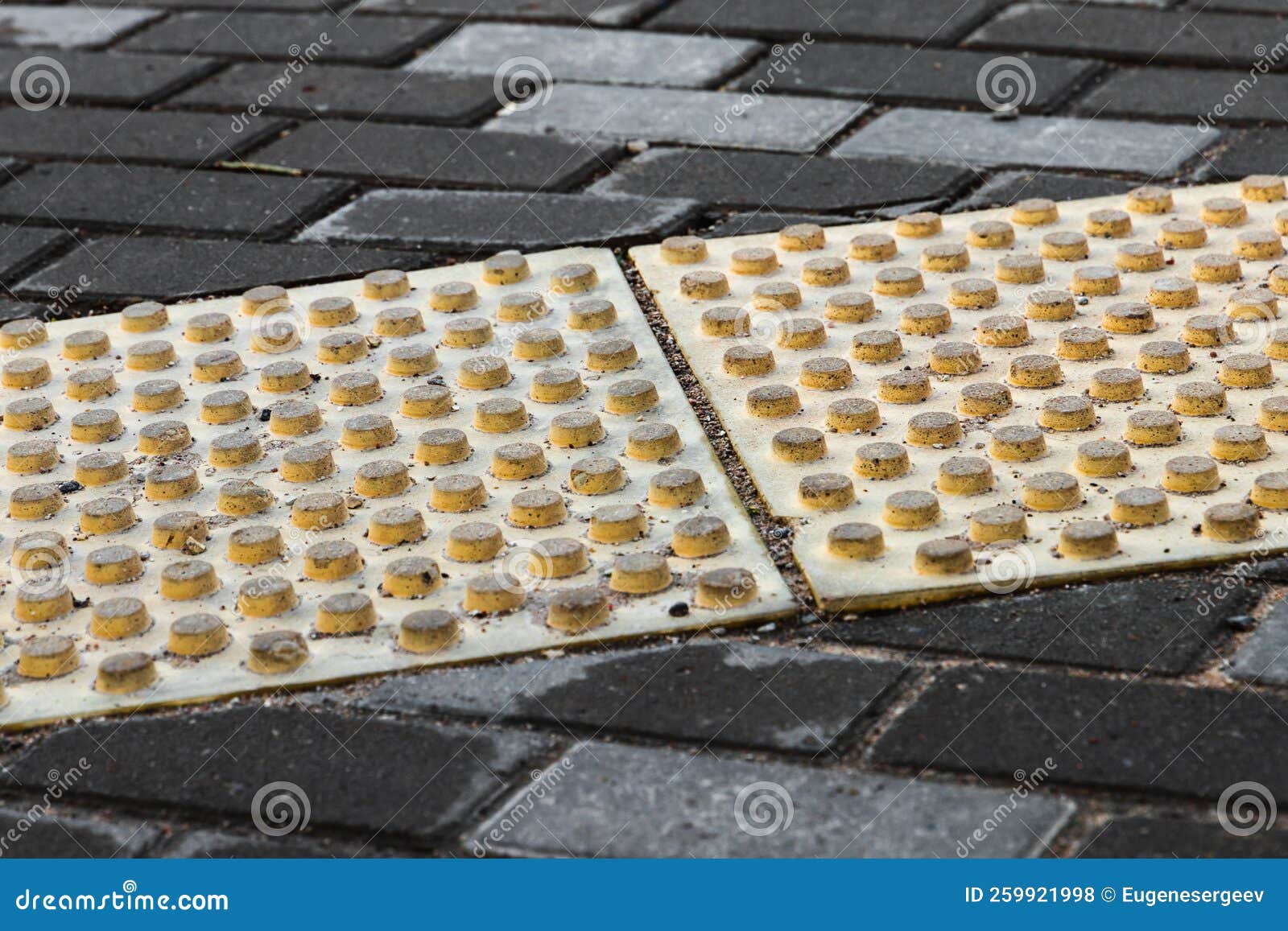 Street Pavement with Gray Bricks and Yellow Tactile Warning Plates ...