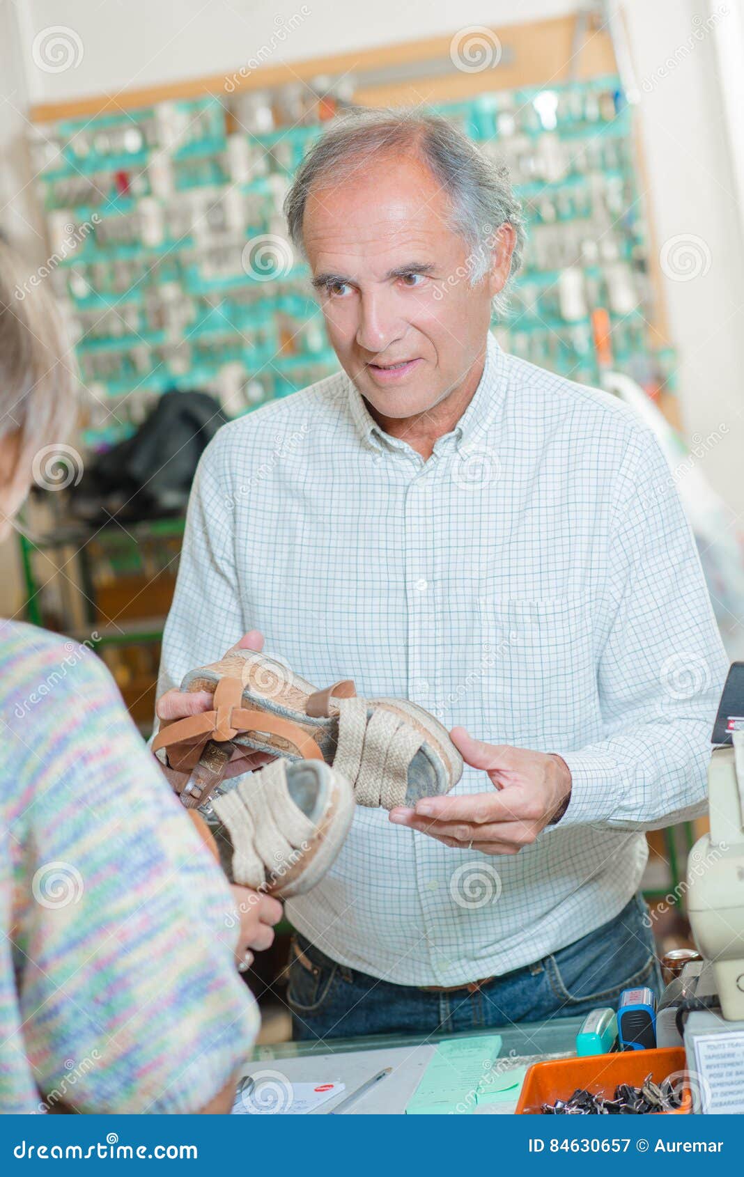 Cobbler Explaining What Needs To Be Done To Shoe Stock Image - Image of ...