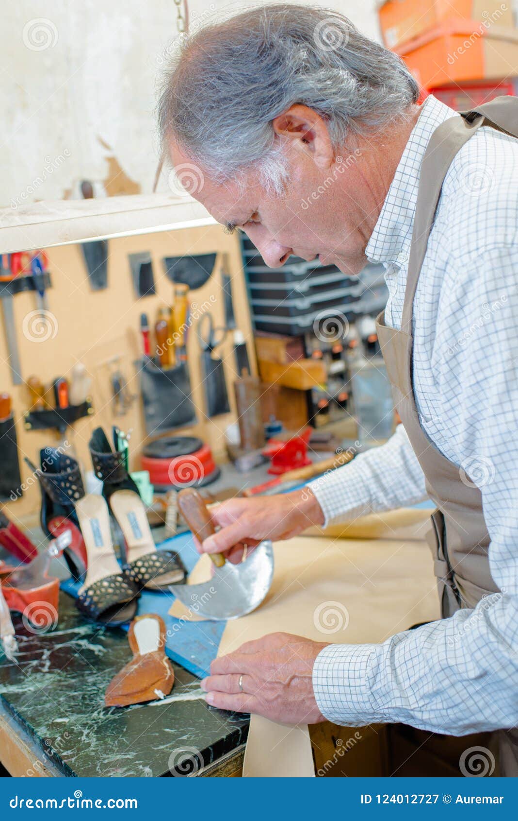 Cobbler hard at work stock image. Image of hand, hammer - 124012727