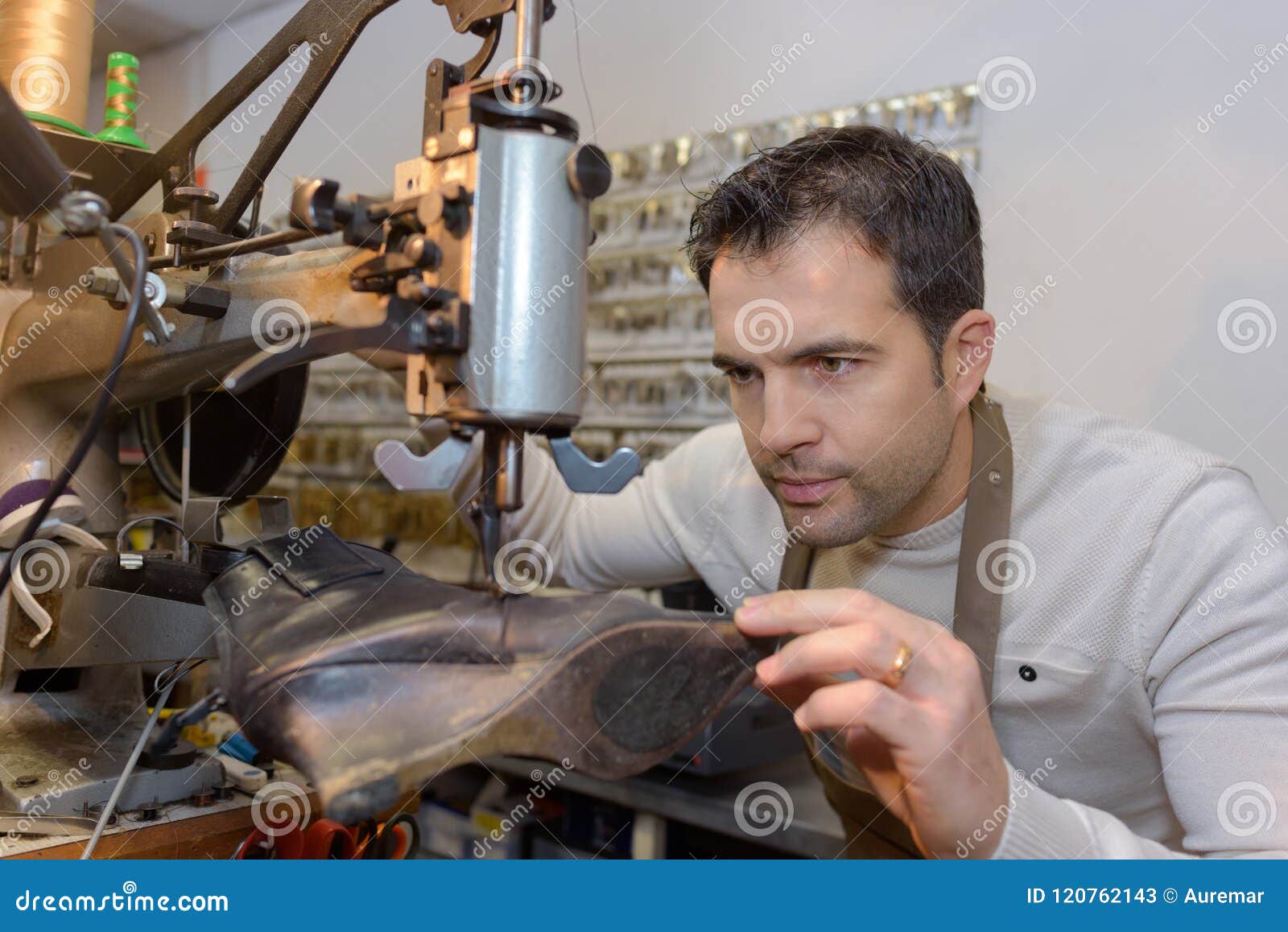 Cobbler repairing a shoe stock image. Image of profession - 120762143