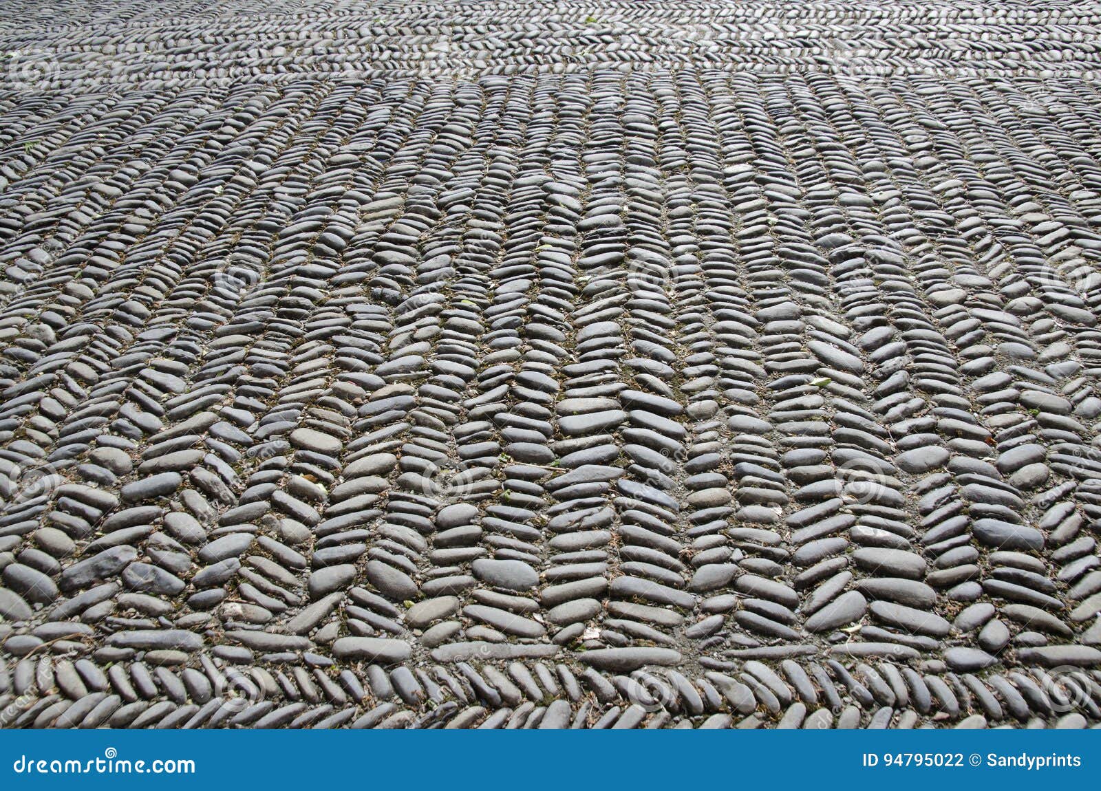 Cobbles in a yard. stock photo. Image of cobbles, road - 94795022