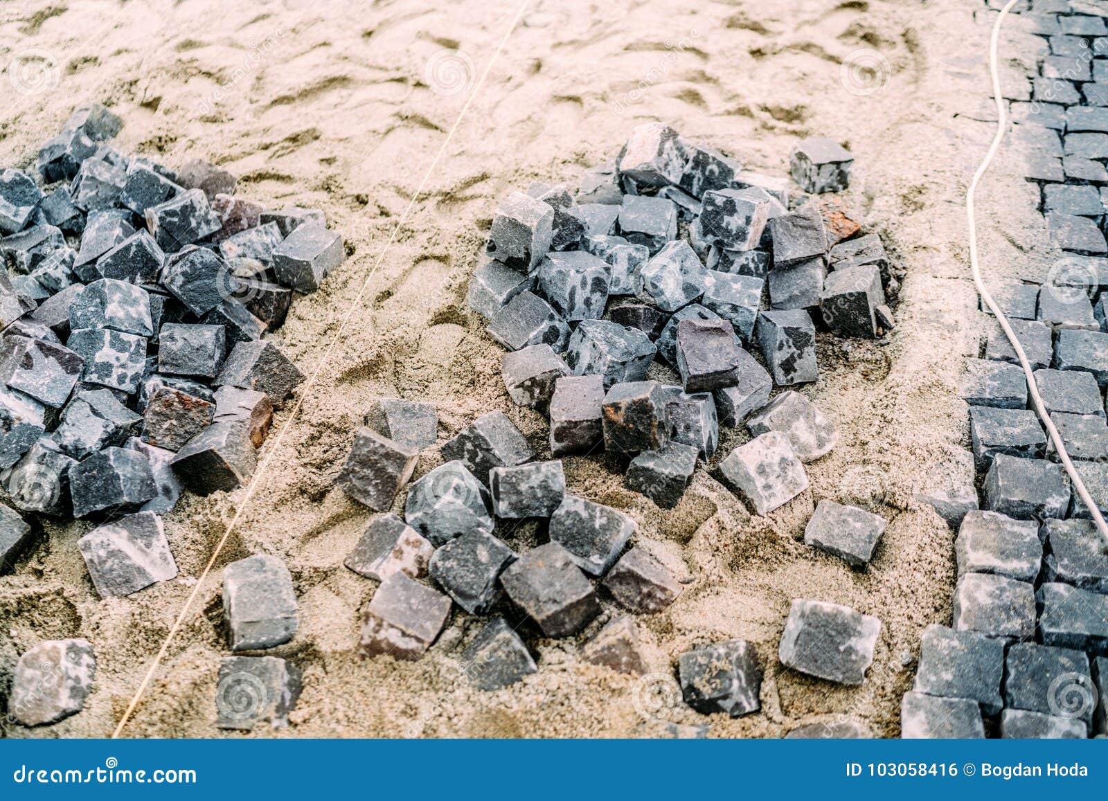 Cobblestone Granite Blocks on Sand Path. Construction of Road with ...