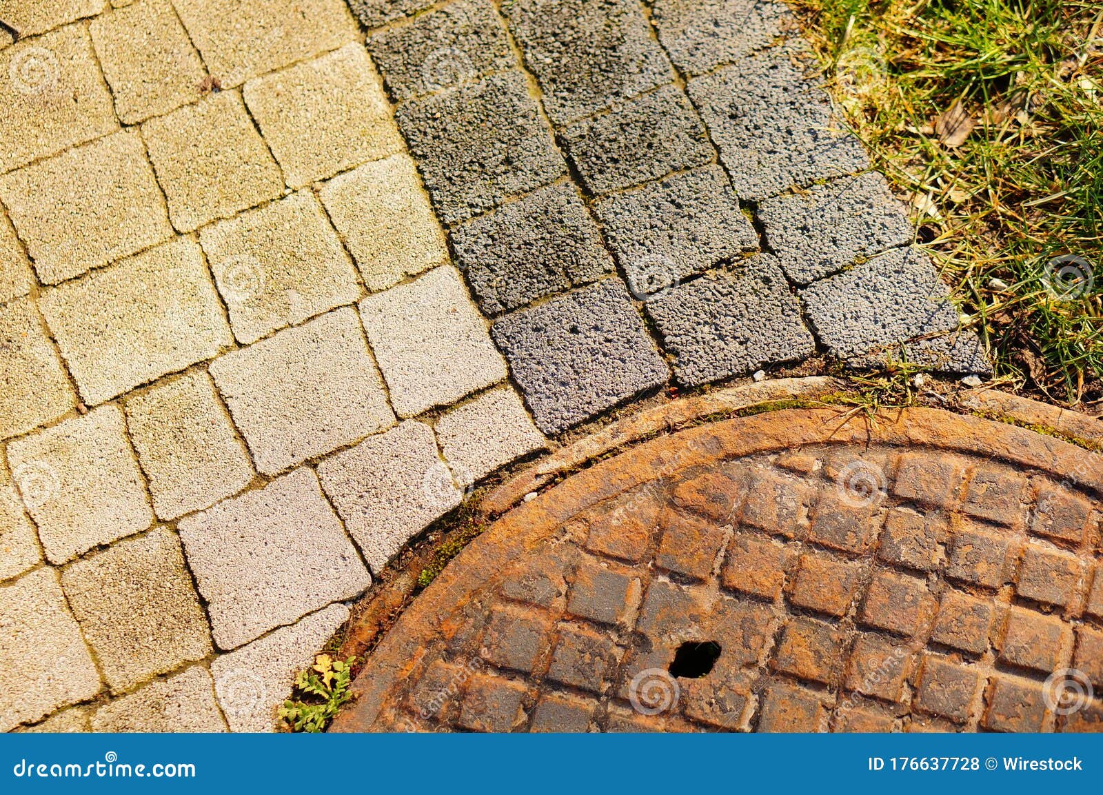 Cobblestone Ground Near a Grassy Field Stock Photo - Image of cobble ...